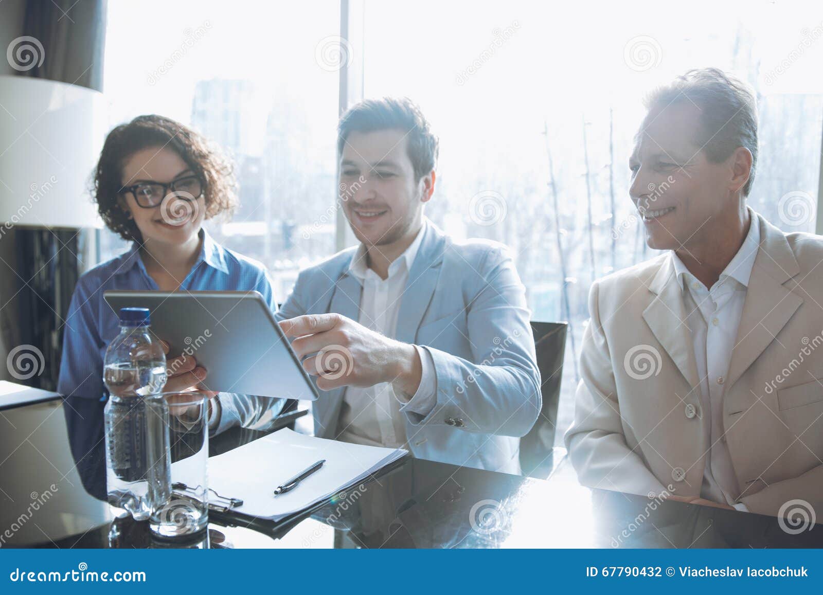 Creative Team Sitting at the Table Stock Photo - Image of team, digital ...
