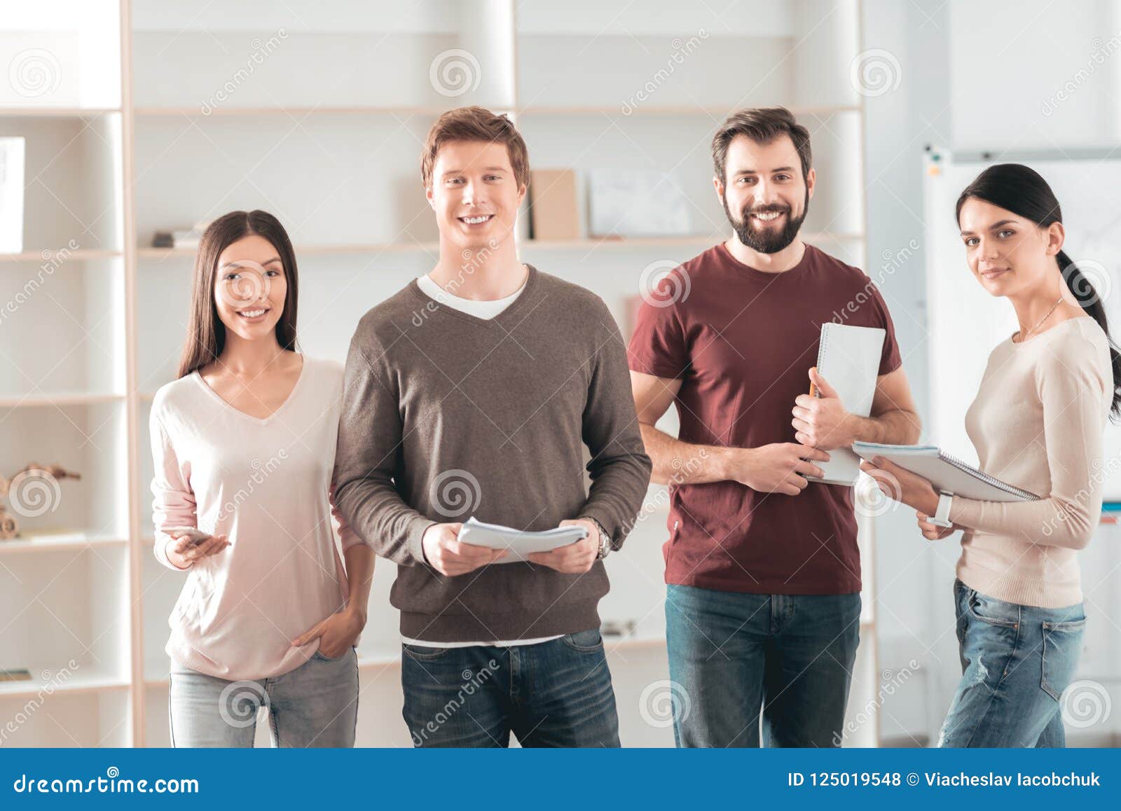 Smart Young People Looking at You Stock Photo - Image of nationality ...