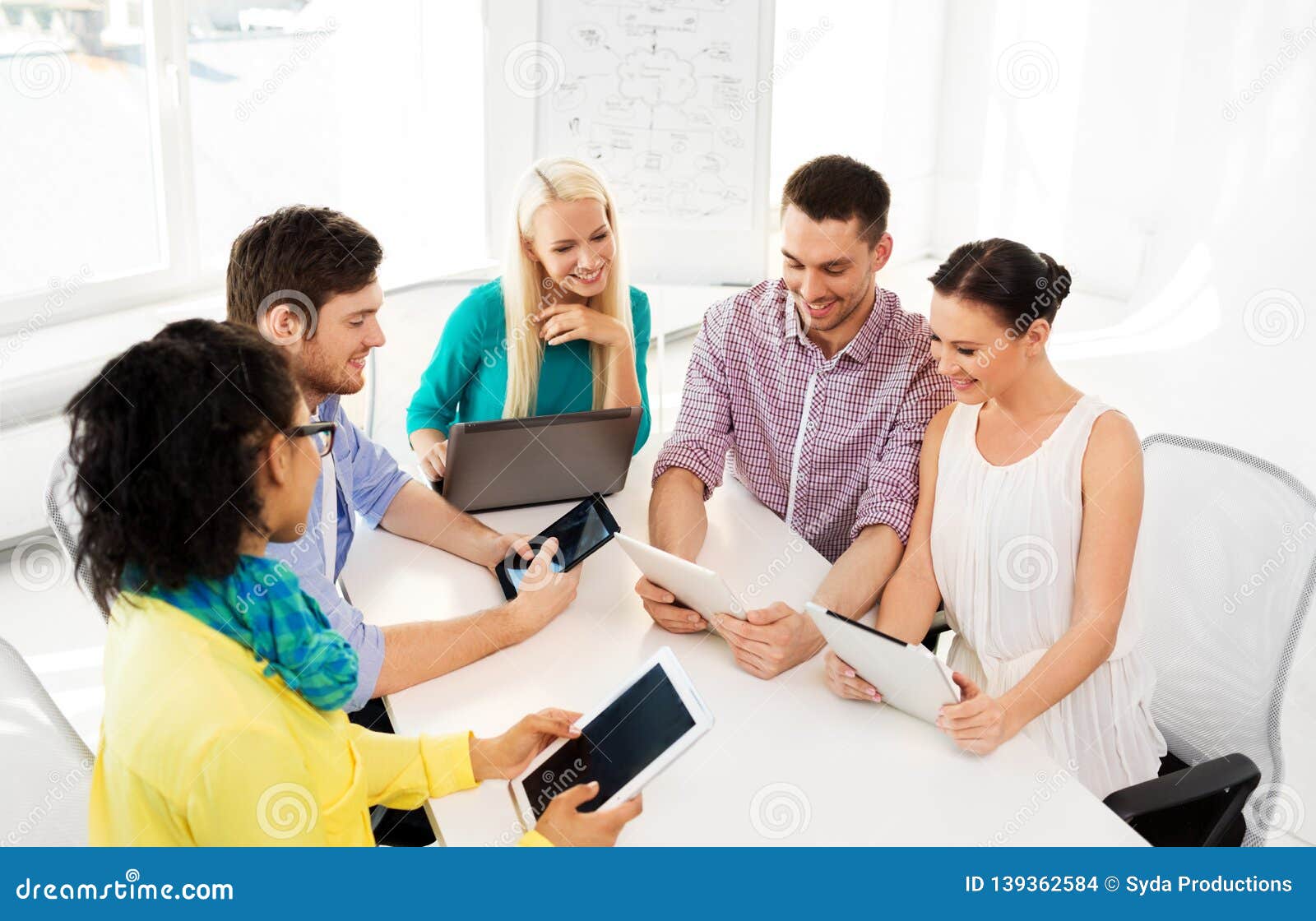 Creative Team with Table Computers in Office Stock Photo - Image of ...