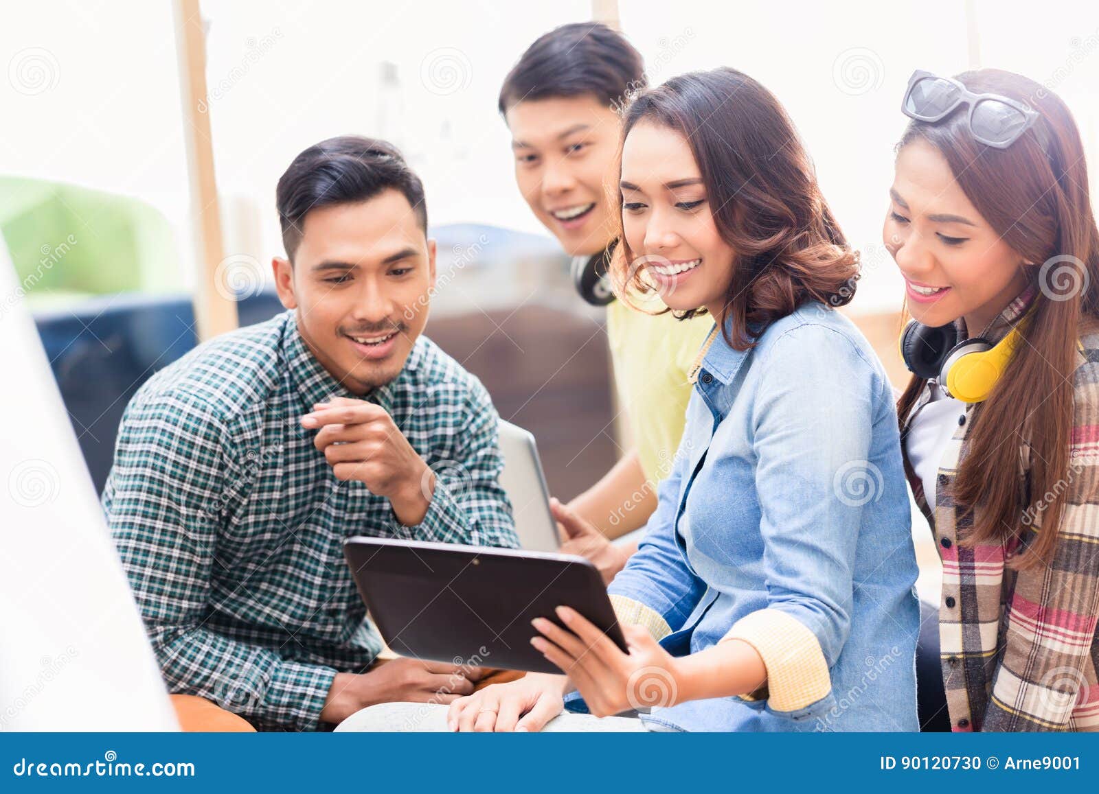 Creative Team Watching a Surprising Business Presentation on Tab Stock ...