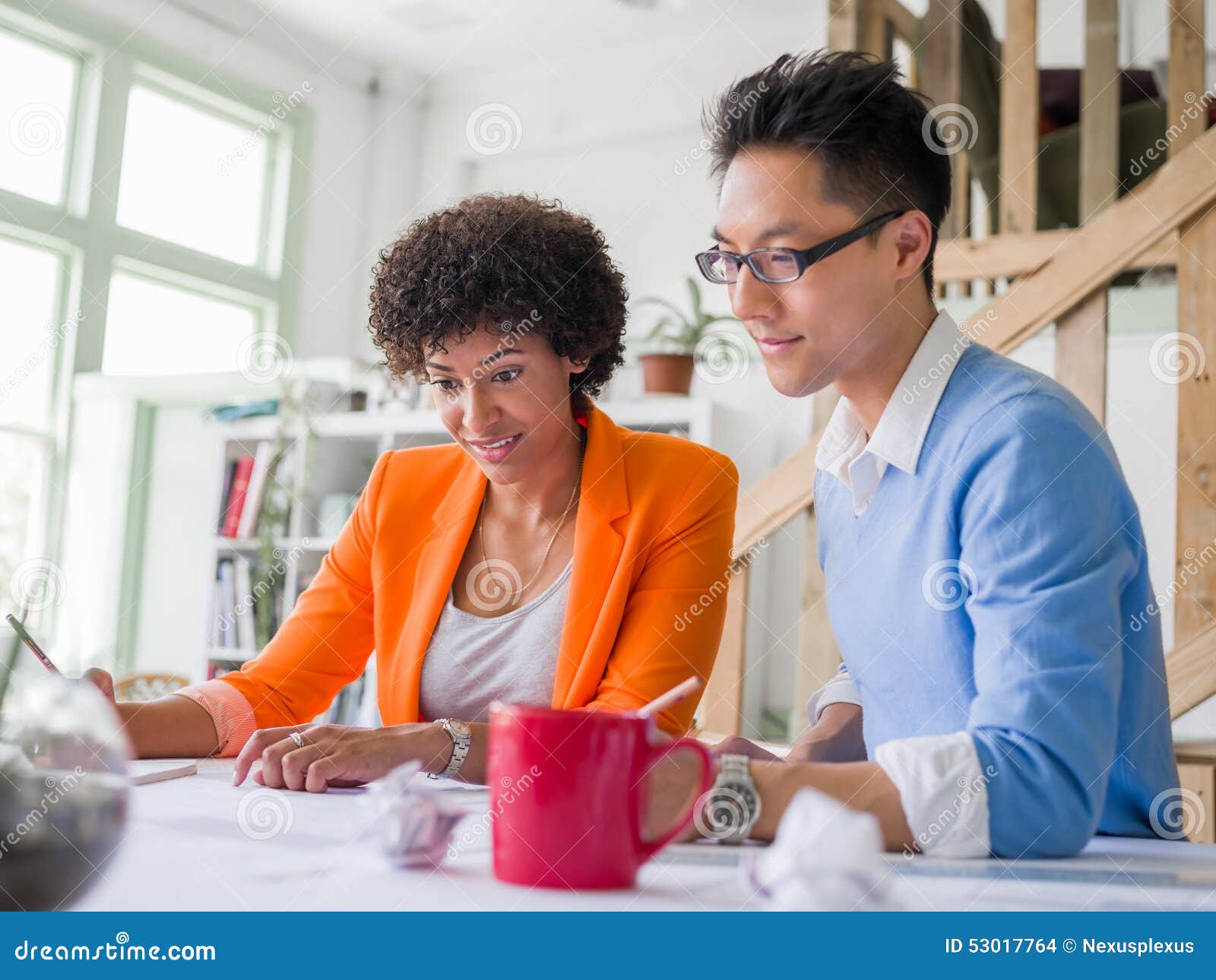 Creative team at work stock photo. Image of people, female - 53017764