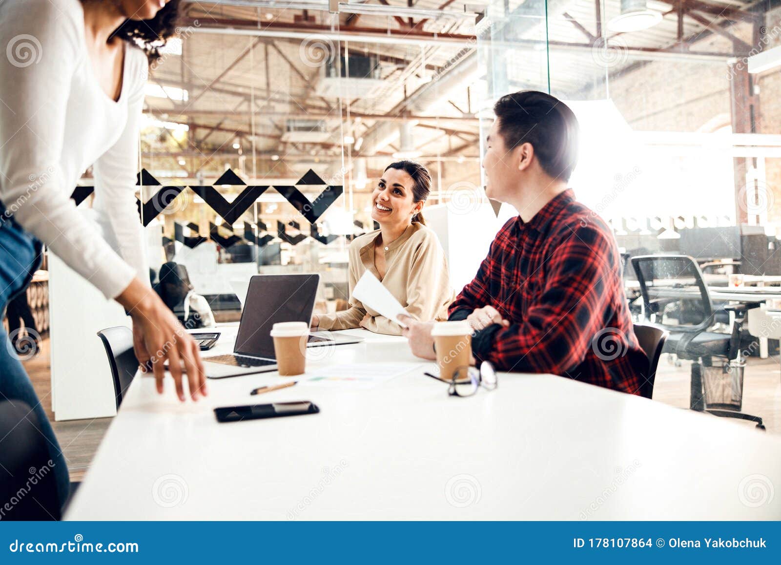 Creative Team Working on Project and Communicating in Office Stock ...