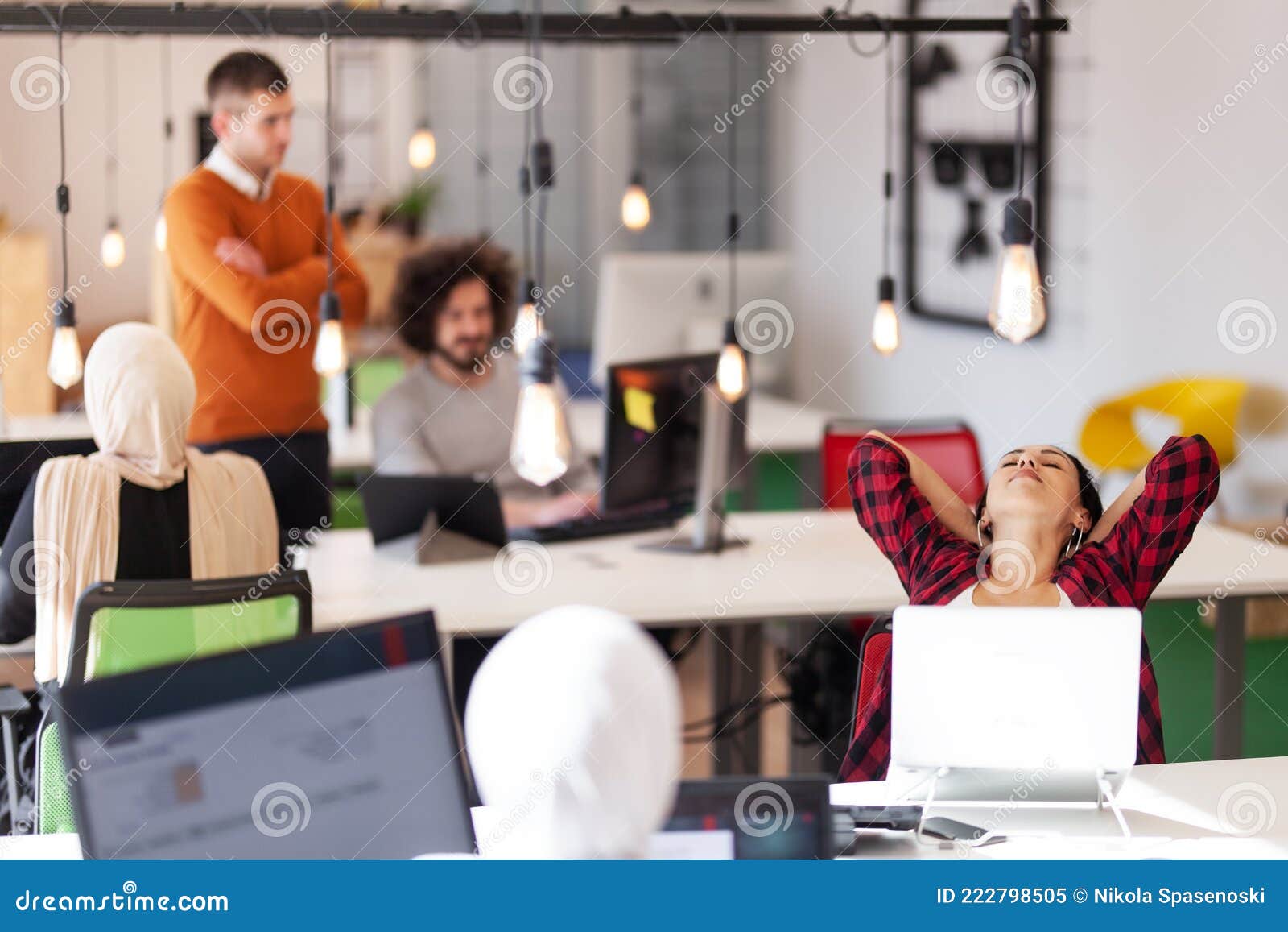 Creative Team of Young Individuals Working on Desktop Computers in a ...