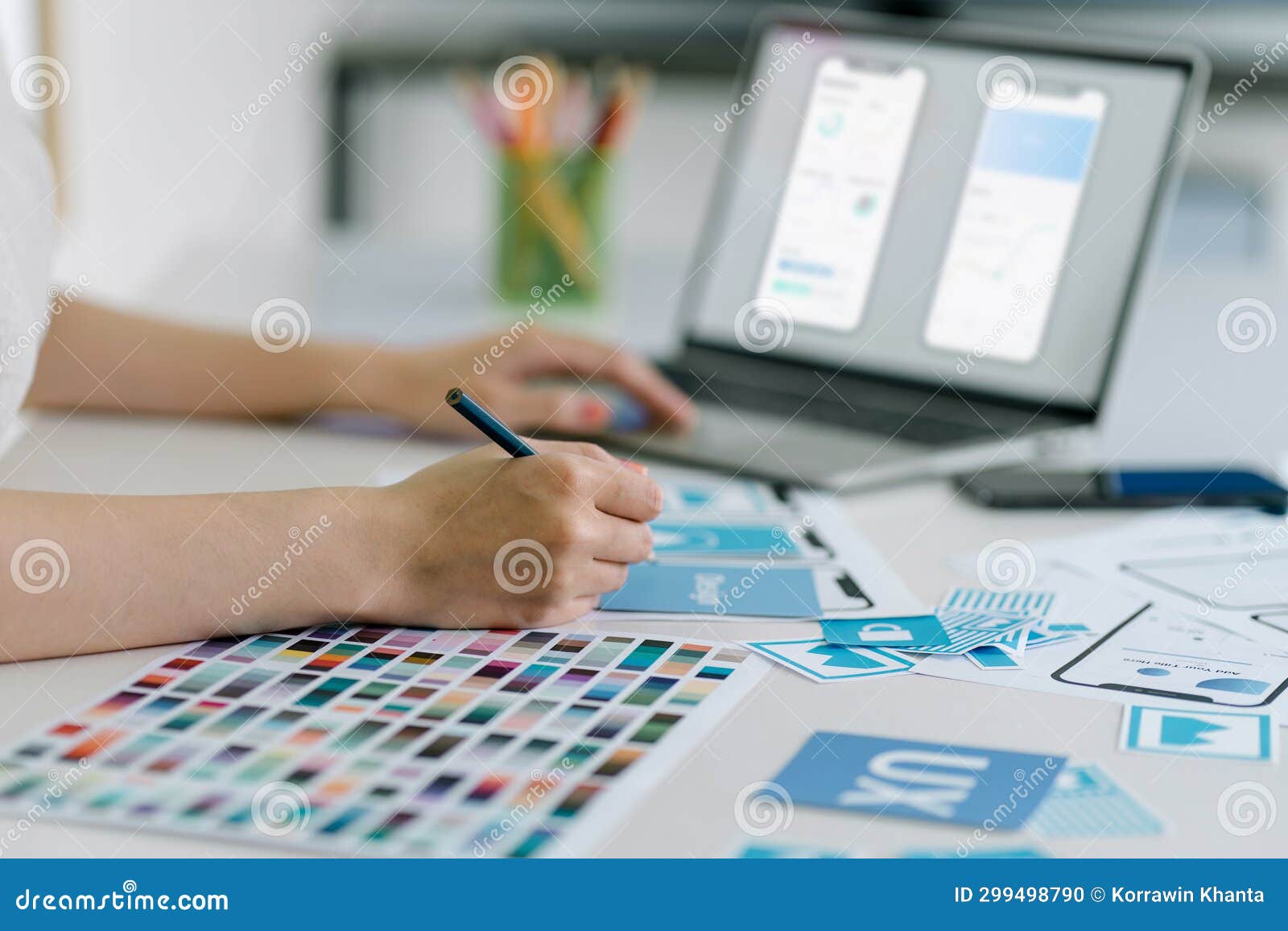 Creative Ux Designer Designing Screens for Mobile Responsive ...