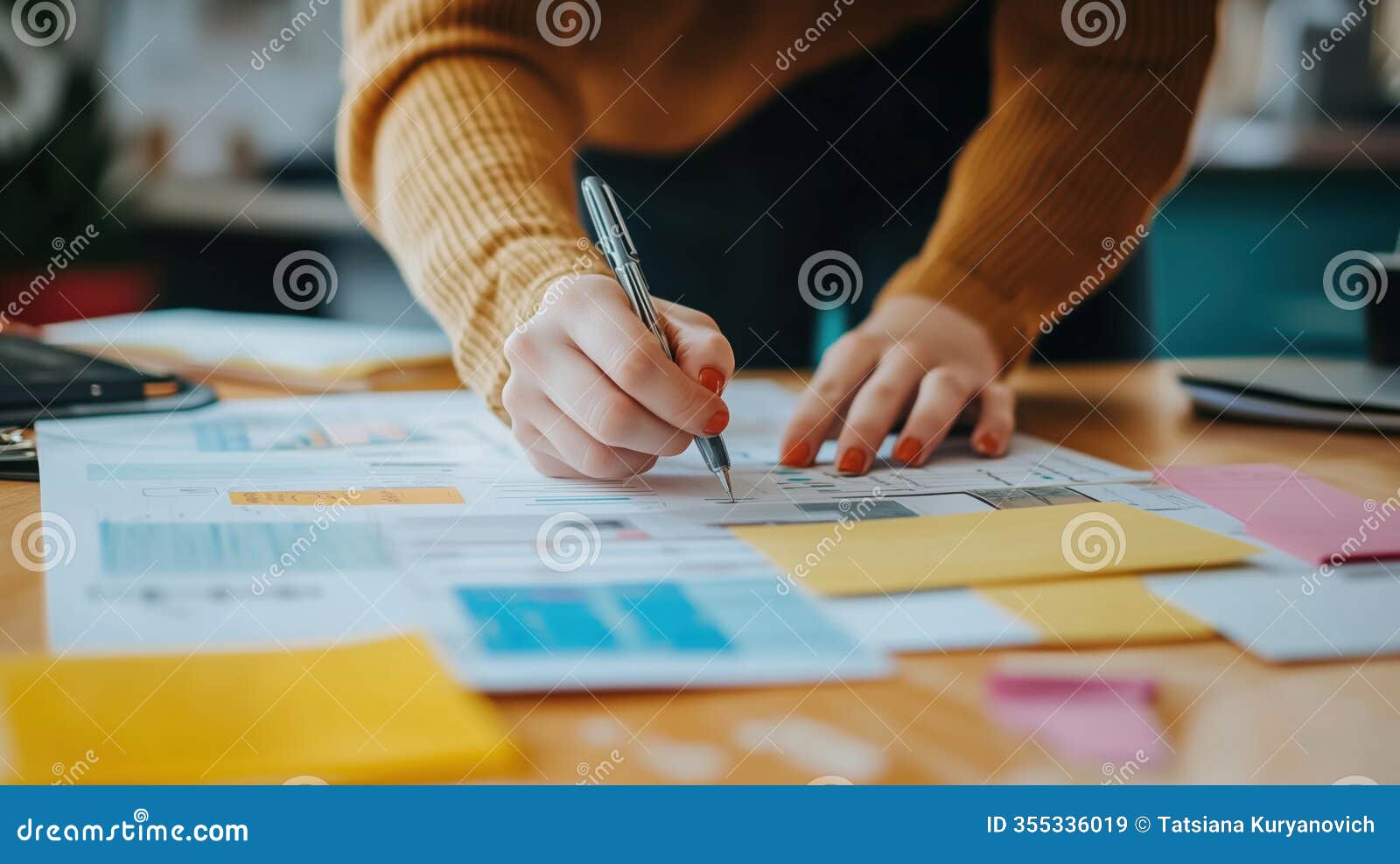 Creative Workspace with Design Sketches and Sticky Notes, Person ...