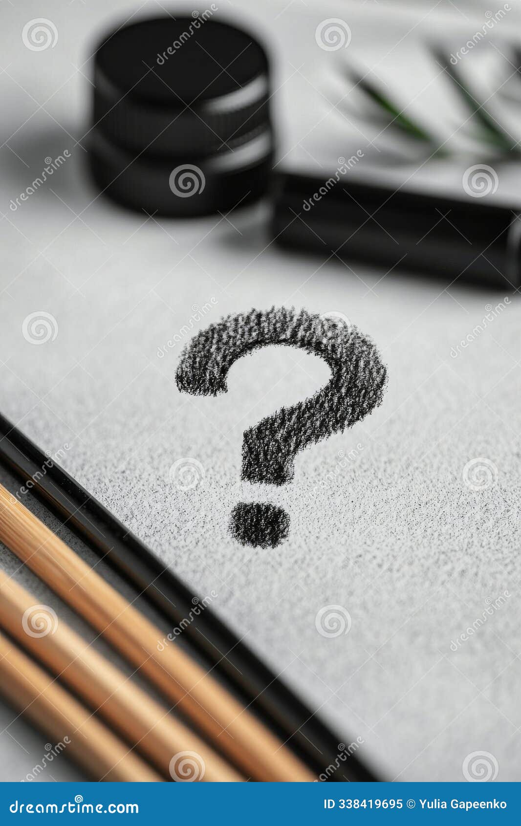 Creative Workspace with a Question Mark Drawn in Charcoal among Pencils ...