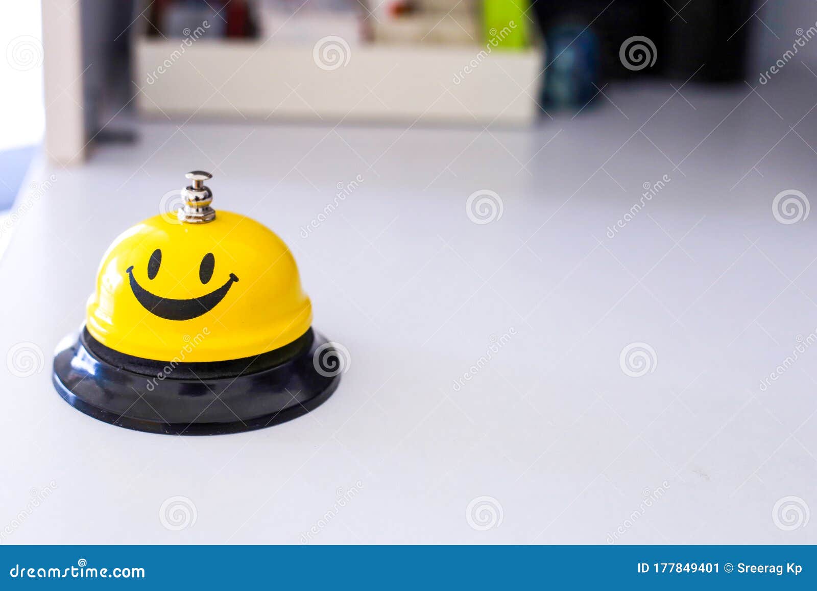 Creative Yellow Smiley Bell on Table, Smiley Bell Stock Image - Image ...