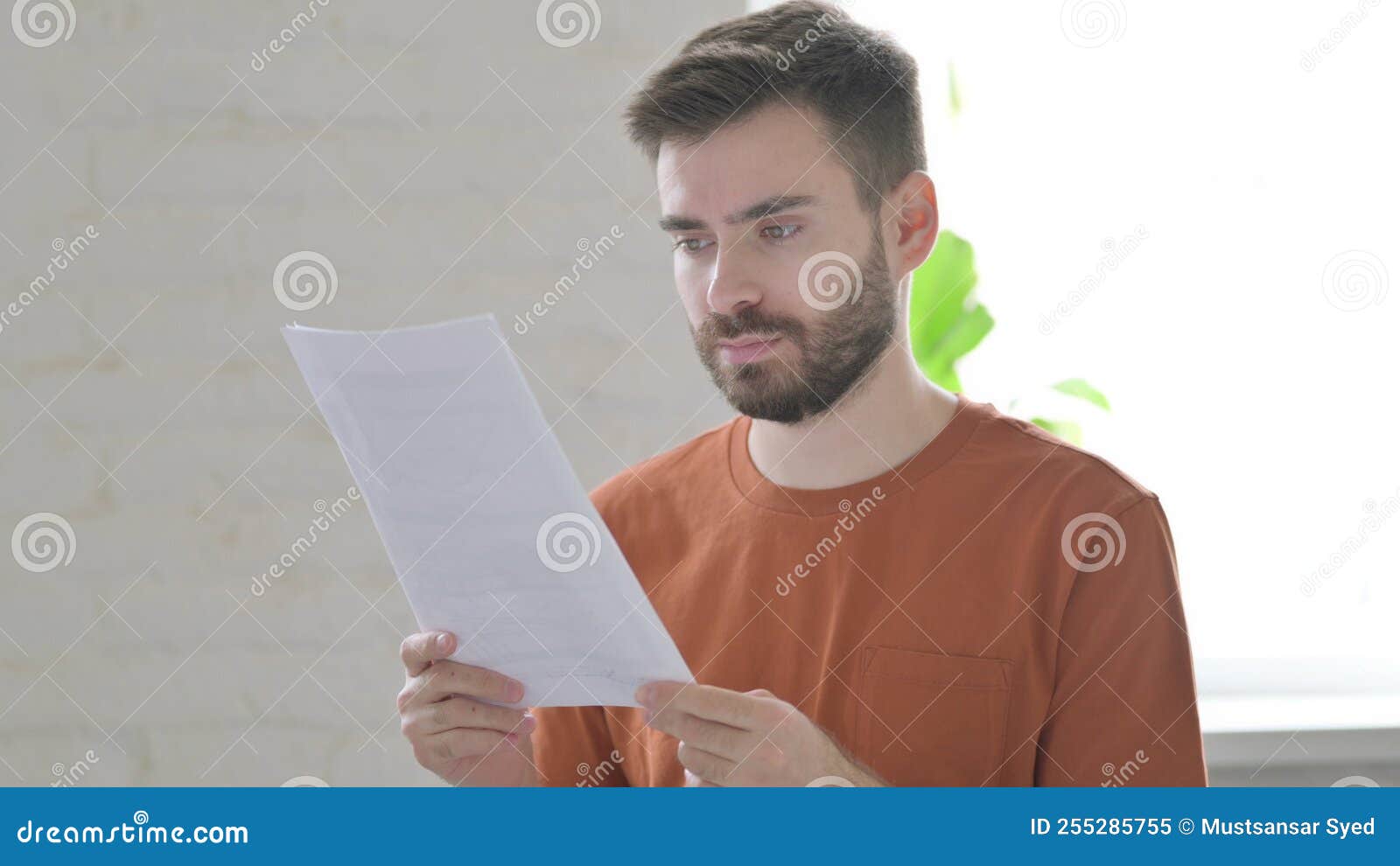 Young Man Reading Documents for Work, Paperwork Stock Image - Image of ...