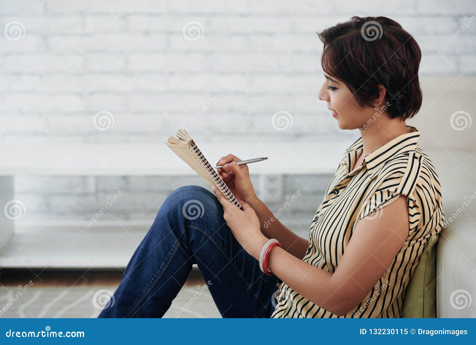 Creative young woman stock image. Image of notepad, thinking - 132230115