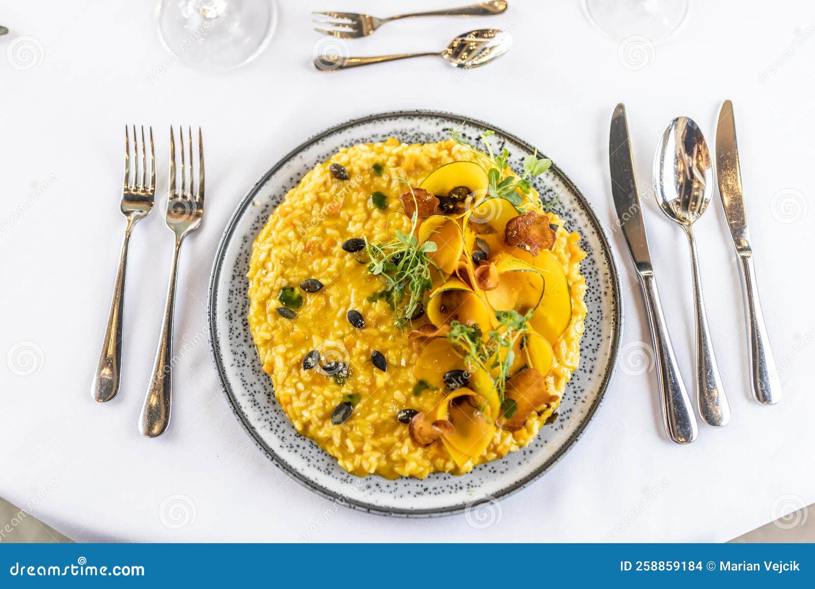 Creatively Cooked Pumpkin Risotto Served on a Ceremonially Prepared ...