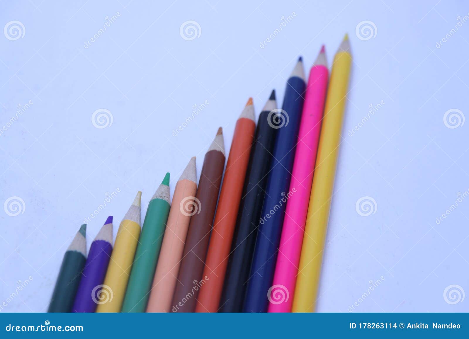 Different Pencil Colors In A Row On A Black Drawing Sheet Stock Image ...