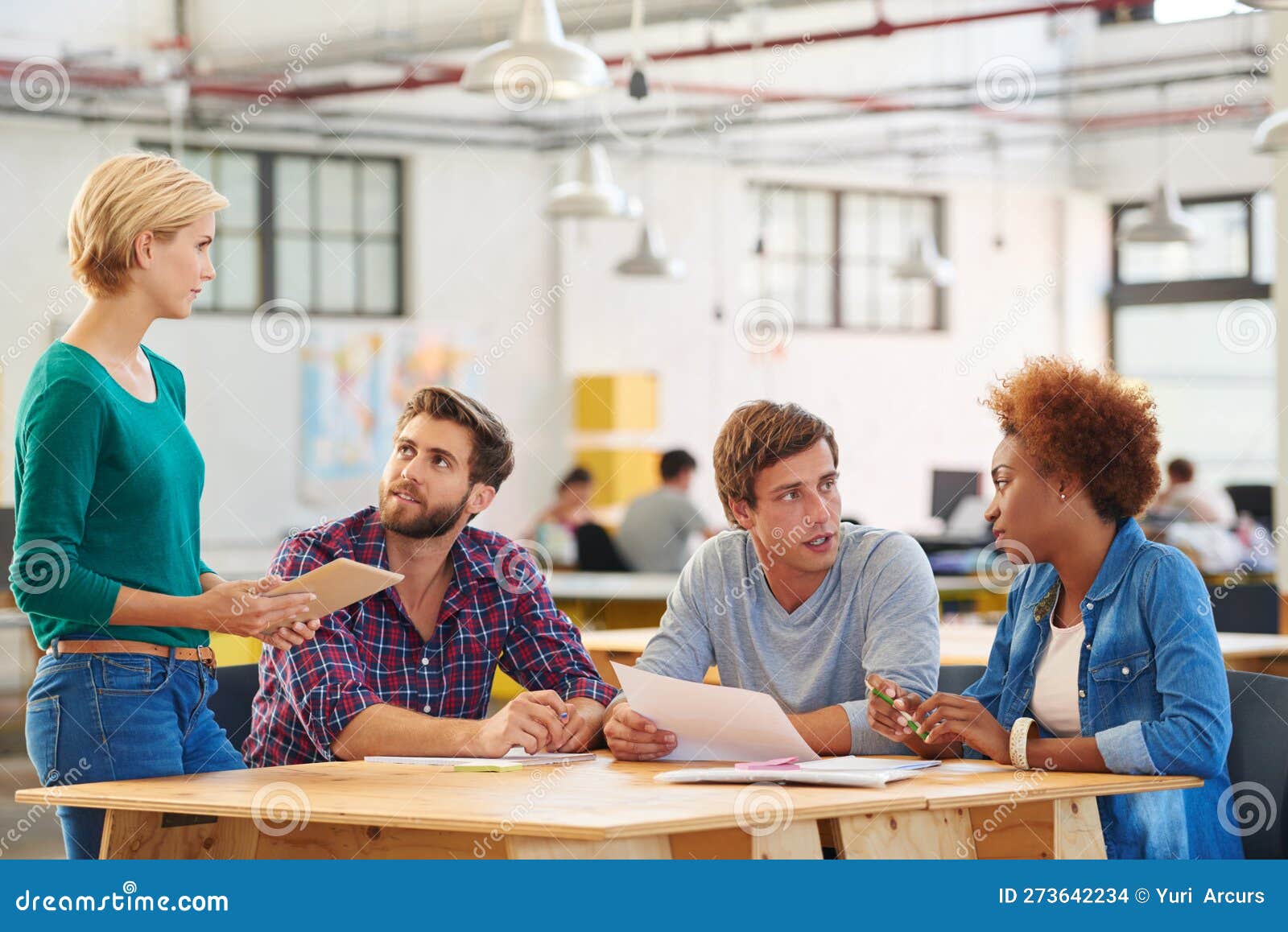 Creativity in Process. a Group of Colleagues Collaborating with Each ...