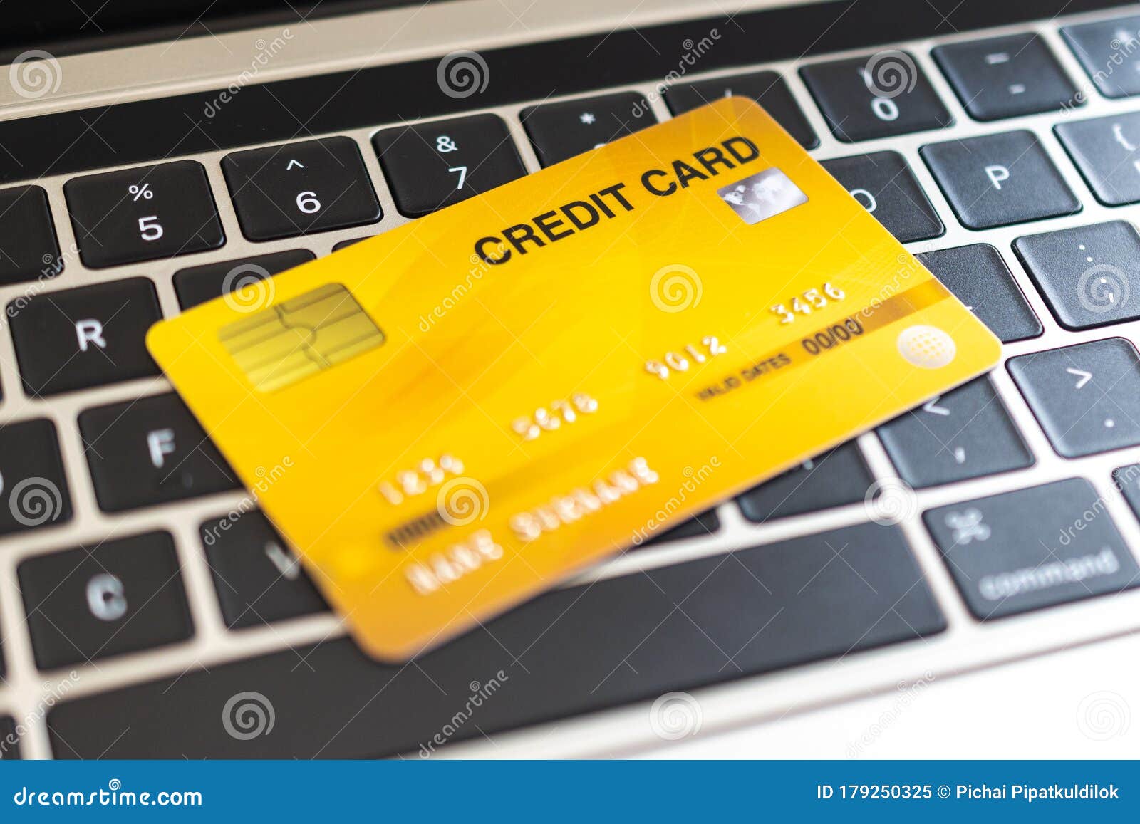 Credit Card on a Computer Keyboard. Internet Purchase Concept Editorial ...