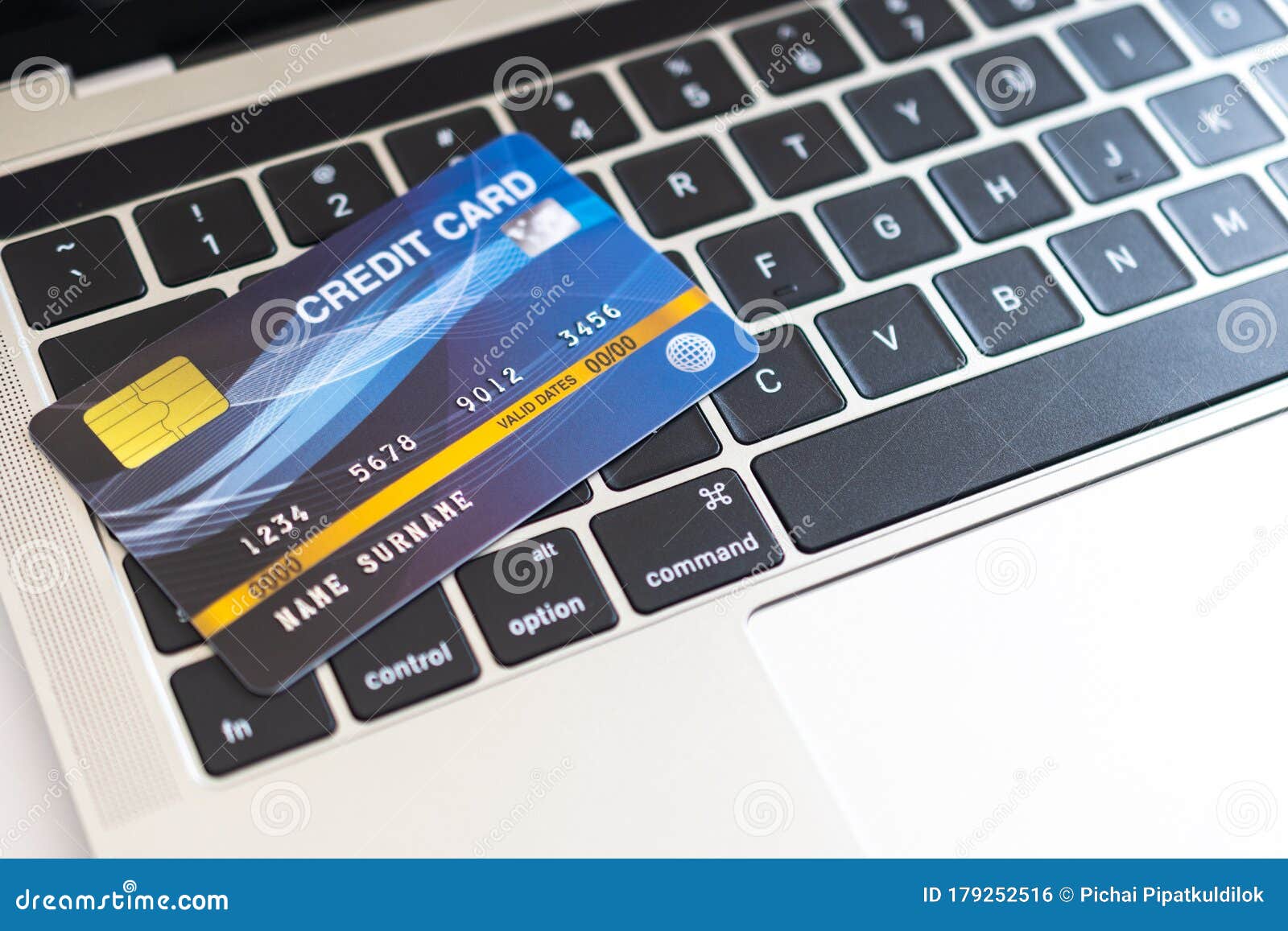 Credit Card on a Computer Keyboard. Internet Purchase Concept Editorial ...