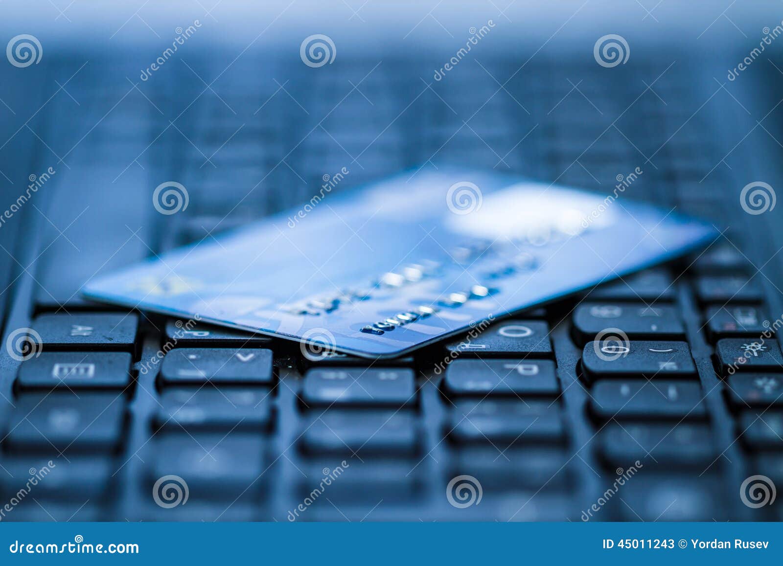 Credit card on keyboard stock image. Image of notebook - 45011243