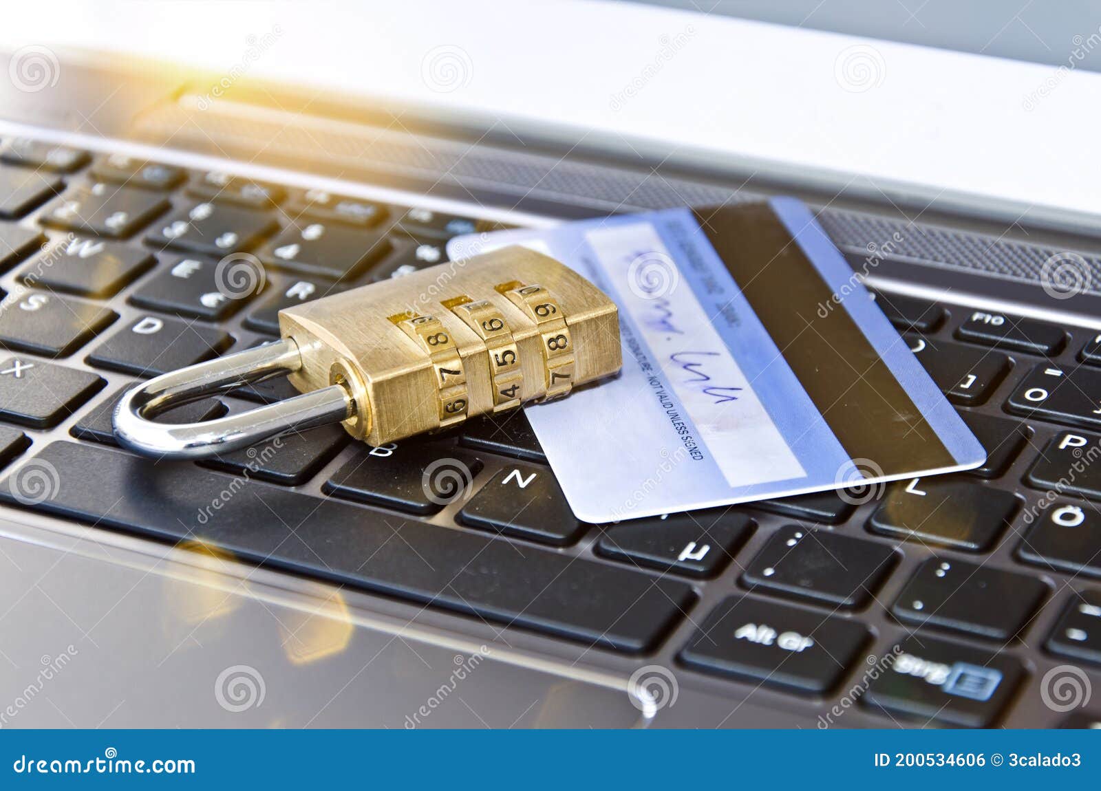 Credit Card with Padlock on Computer Keyboard Symbolising Secure Online ...
