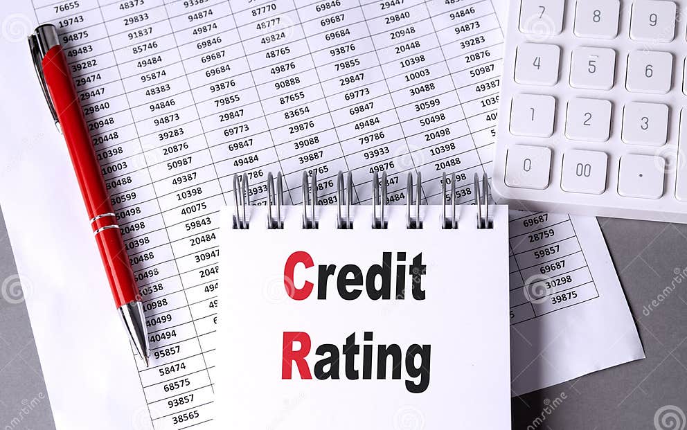CREDIT RATING Text on Notebook with Chart , Pen and Calculator Stock ...