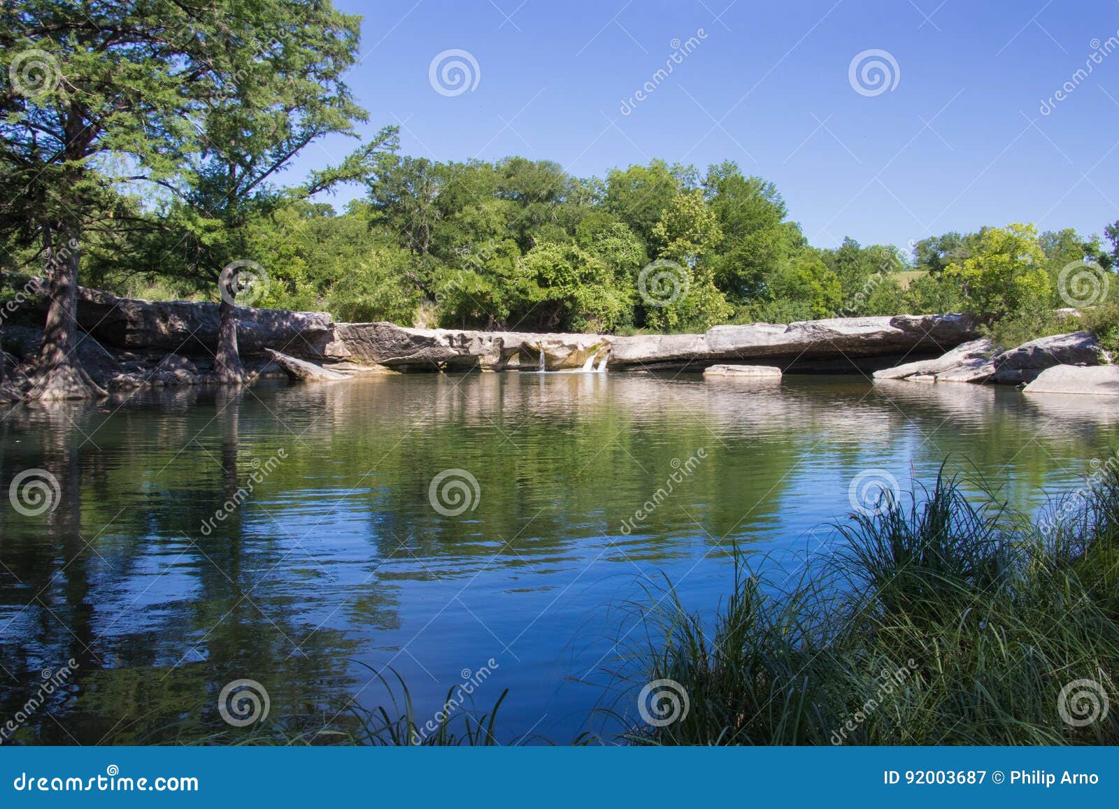 A Creek Basin Bordered by Limestone and Trees Stock Image - Image of ...