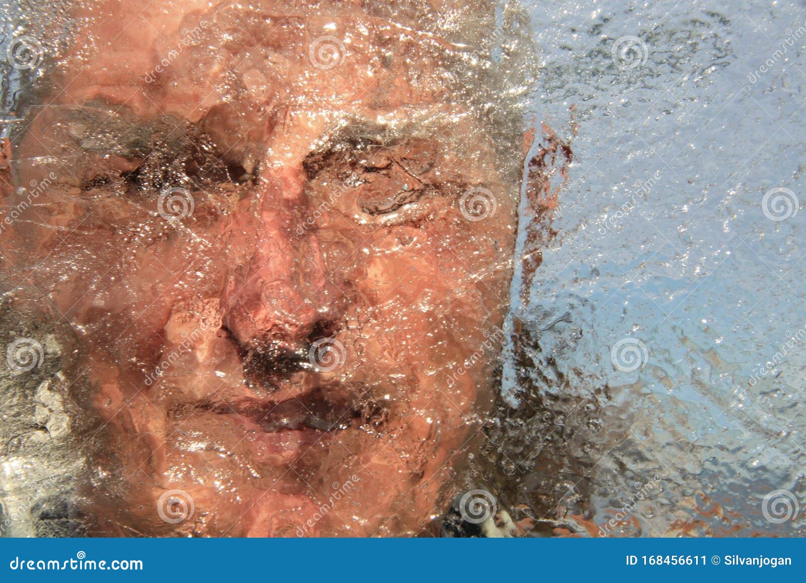 A Creepy Deformed Mans Face Under Layer of Ice Stock Image - Image of ...