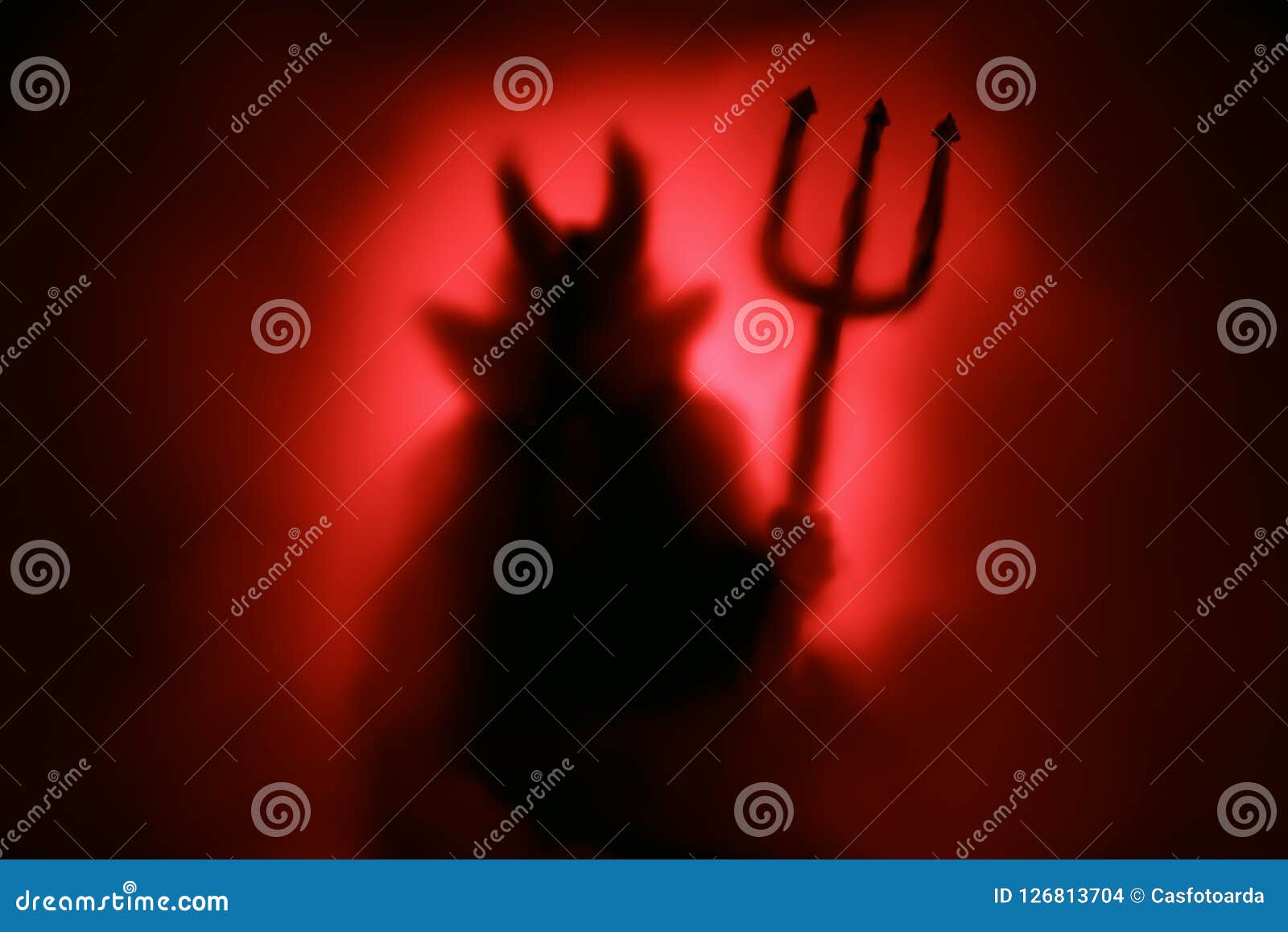 Creepy Devil Silhouette on a Red Background. Stock Photo - Image of ...