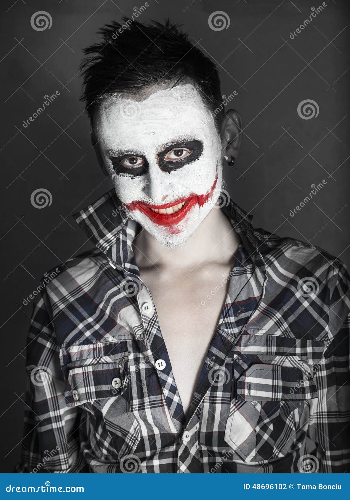 Creepy joker laughing stock photo. Image of halloween - 48696102
