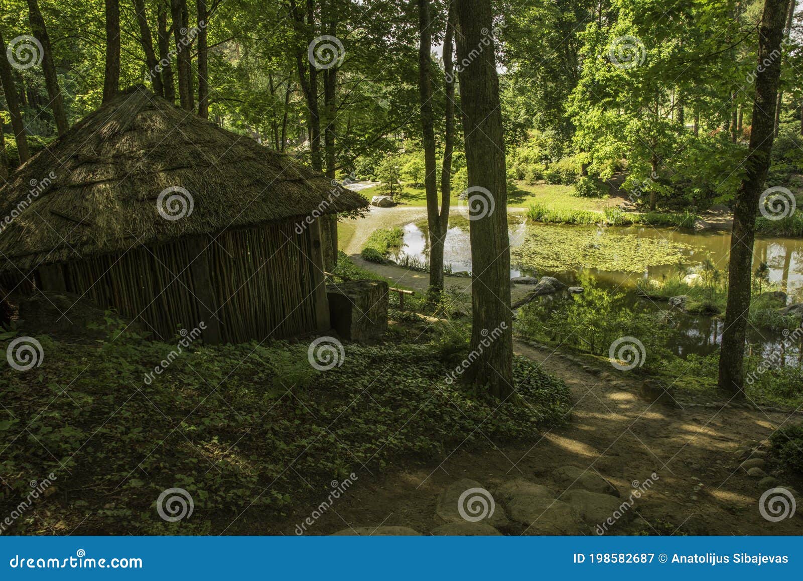 Creepy Old Primitive Straw House in the Forest Stock Image - Image of ...