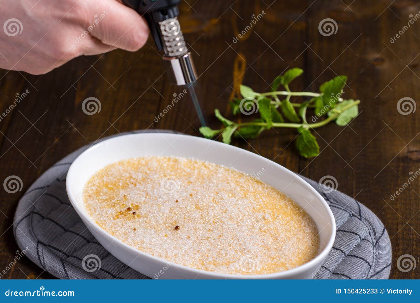 Creme Brulee Caramelizing Using a Hot Torch Stock Image - Image of ...