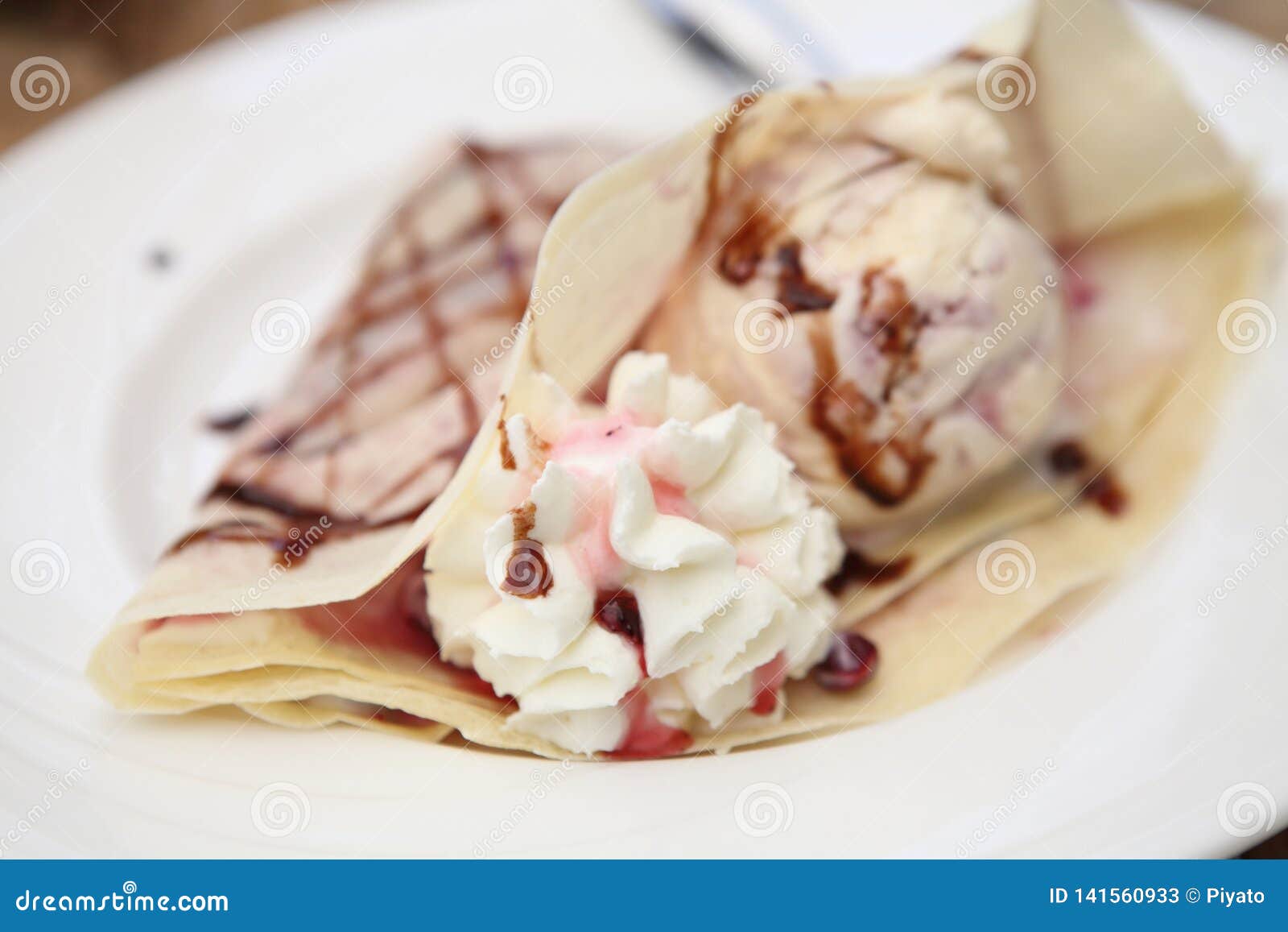 Crepe with ice cream stock image. Image of cream, banana - 141560933