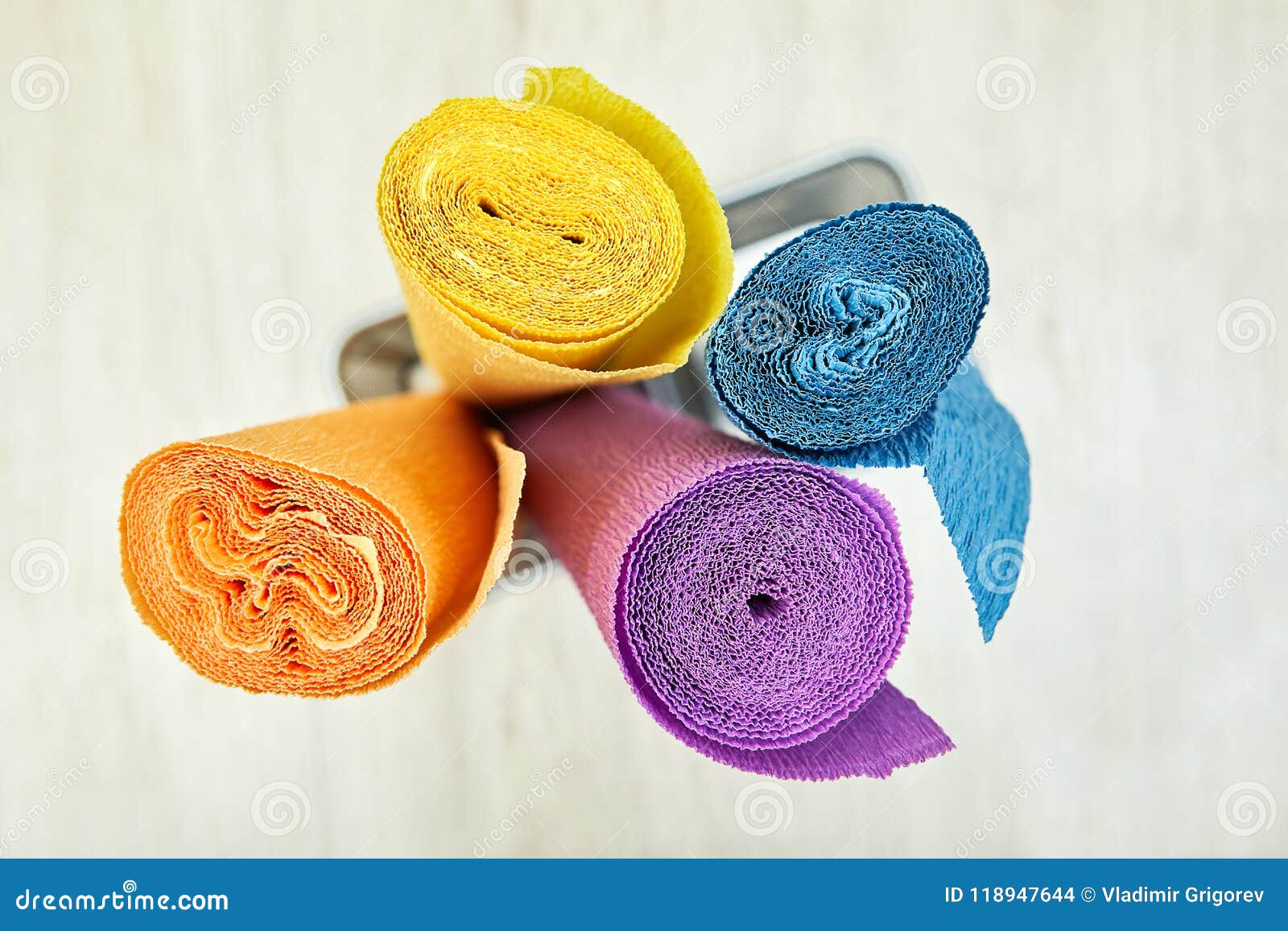 Crepe Wrapping Paper is Twisted into Four Colored Rolls. Stock Photo ...