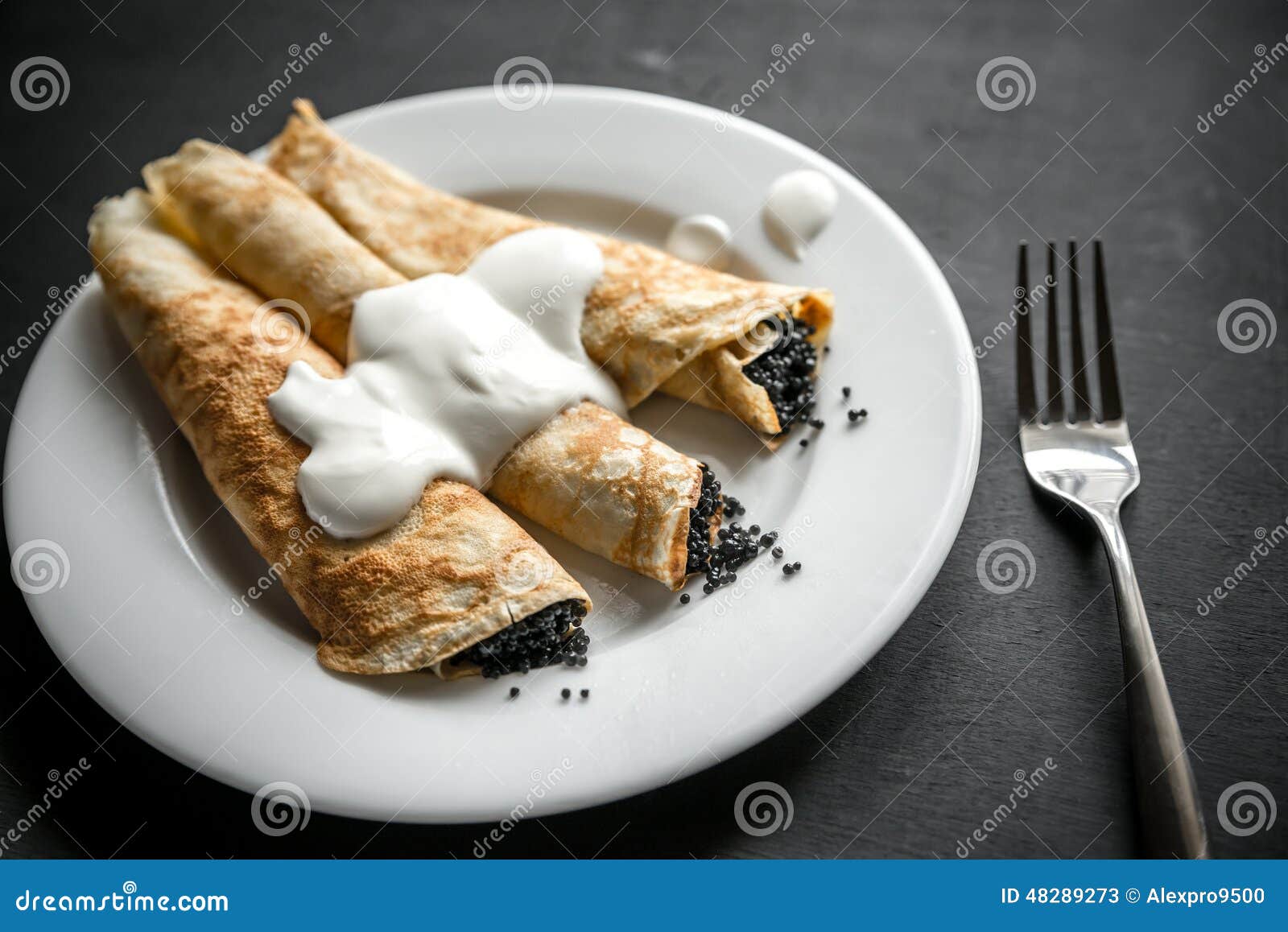 Crepes with black caviar stock image. Image of luxury - 48289273