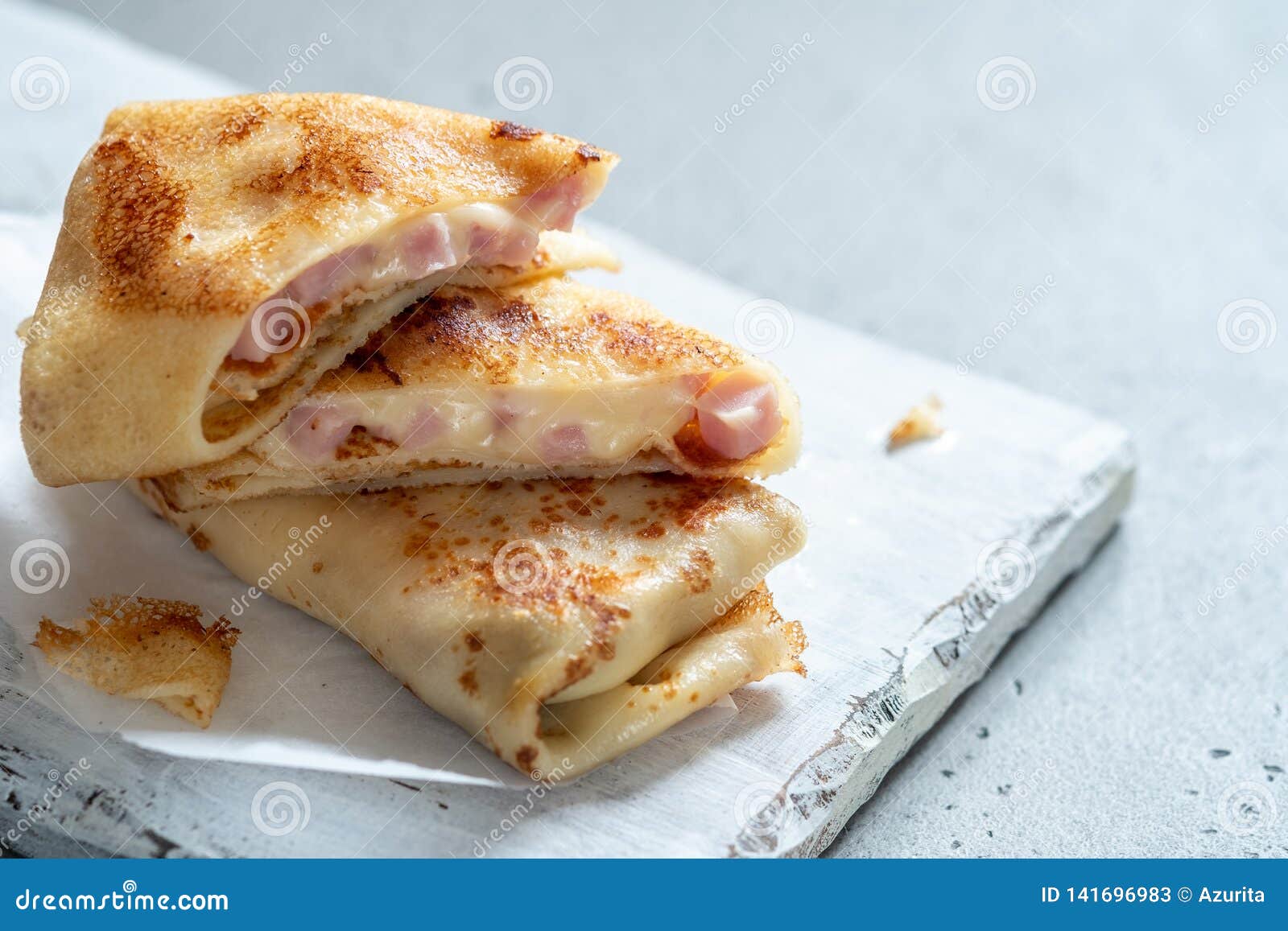 Crepes with ham and cheese stock image. Image of delicious - 141696983
