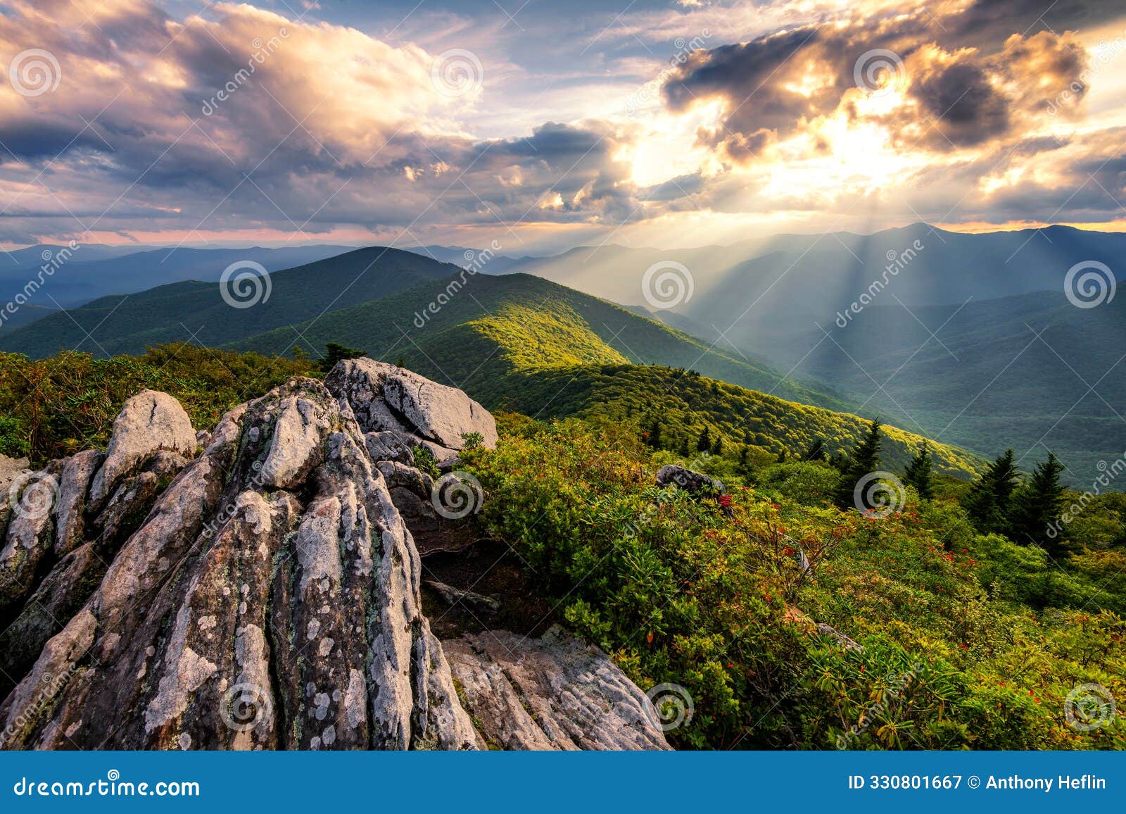 Crepuscular Rays Shining Down on the Blue Ridge Mountains Stock Image ...