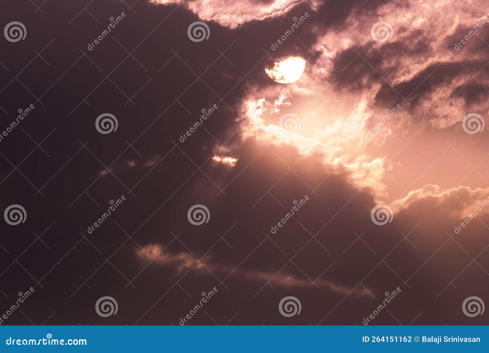 Crepuscular Rays of the Sun Streaming through Dark Clouds Stock Photo ...