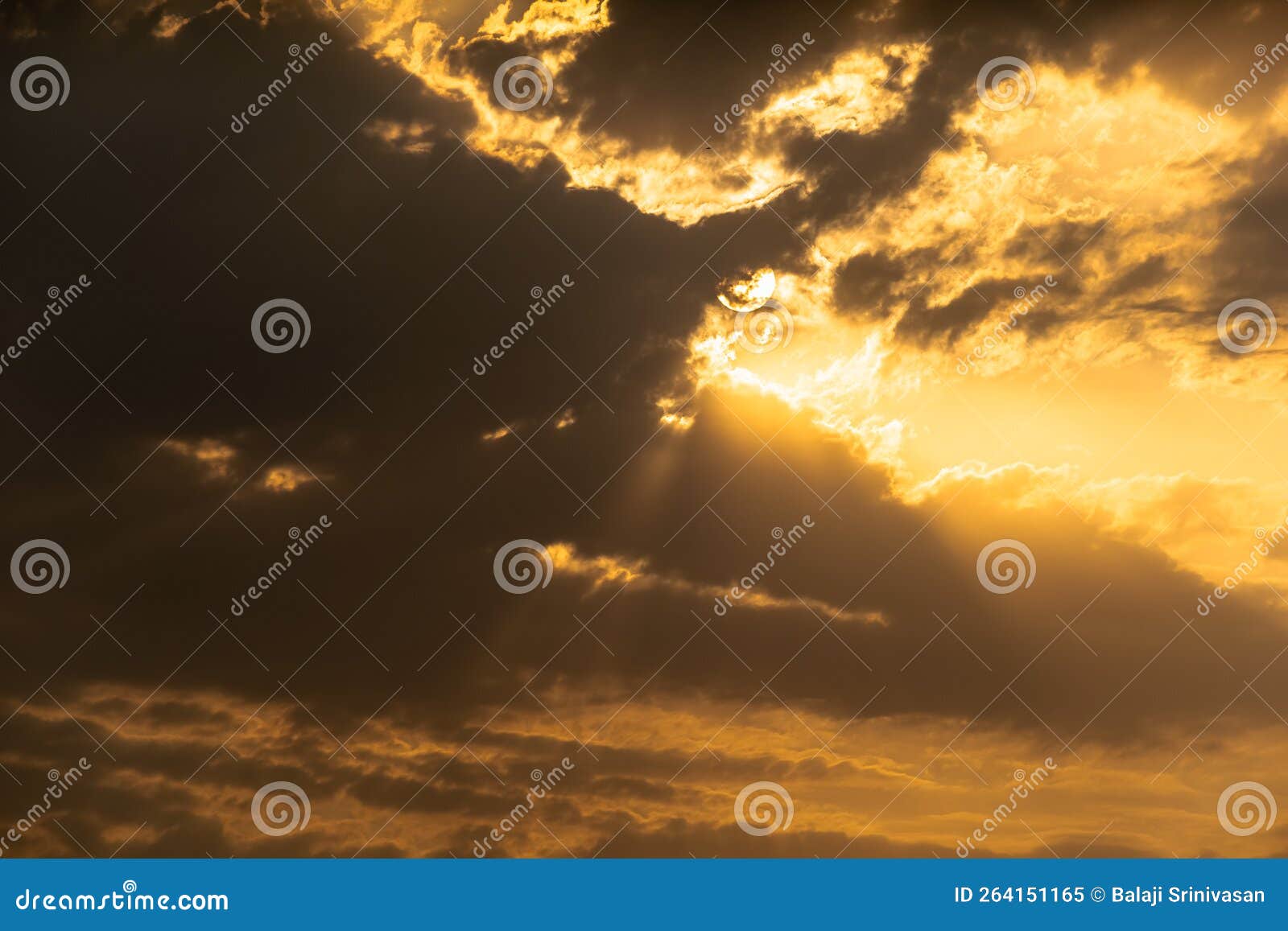 Crepuscular Rays of the Sun Streaming through Dark Clouds Stock Image ...