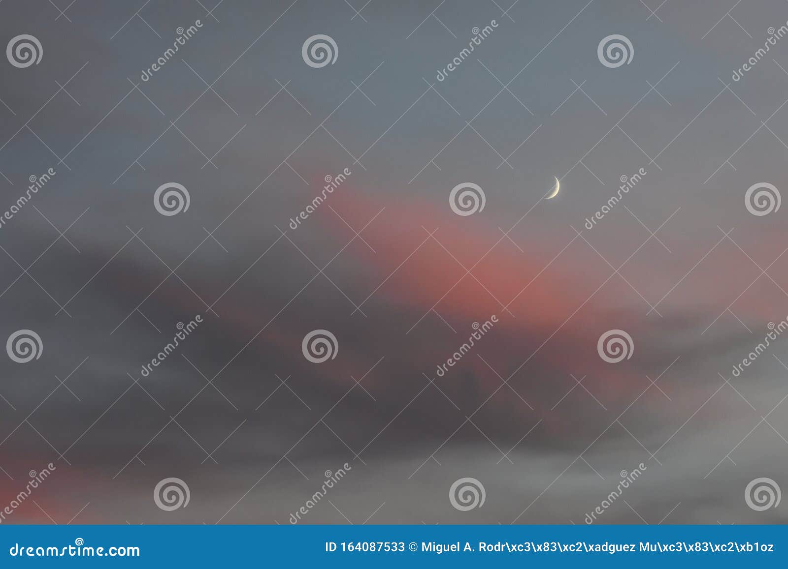 Crescent Moon among Orange Clouds at Sunset Stock Image - Image of ...