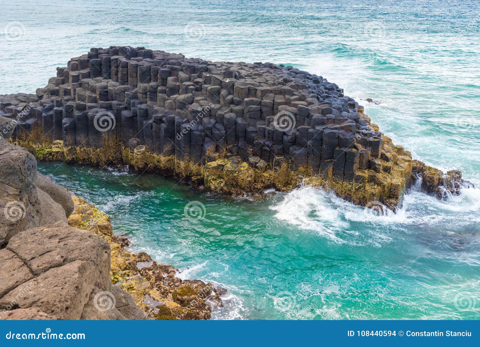 Crescent Shaped Hexagonal Rock Formations Stock Photo - Image of ...