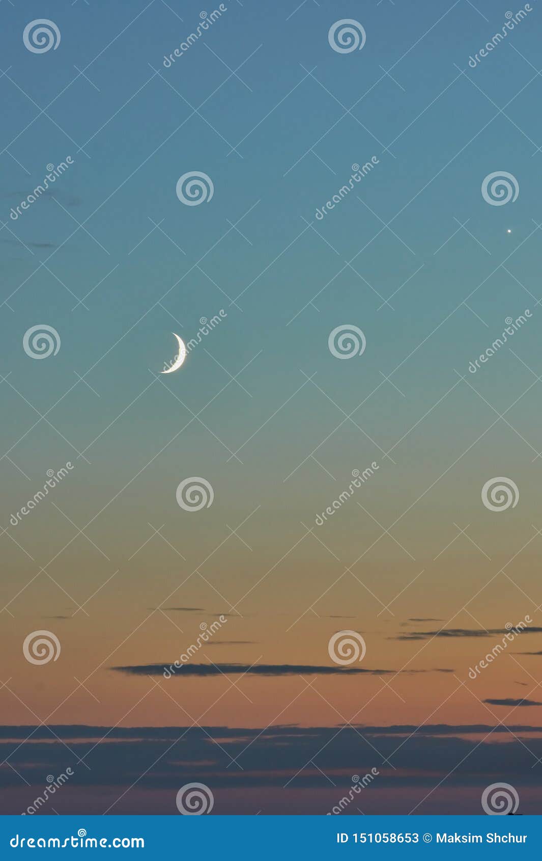 Crescent in the sunset sky stock image. Image of lake - 151058653