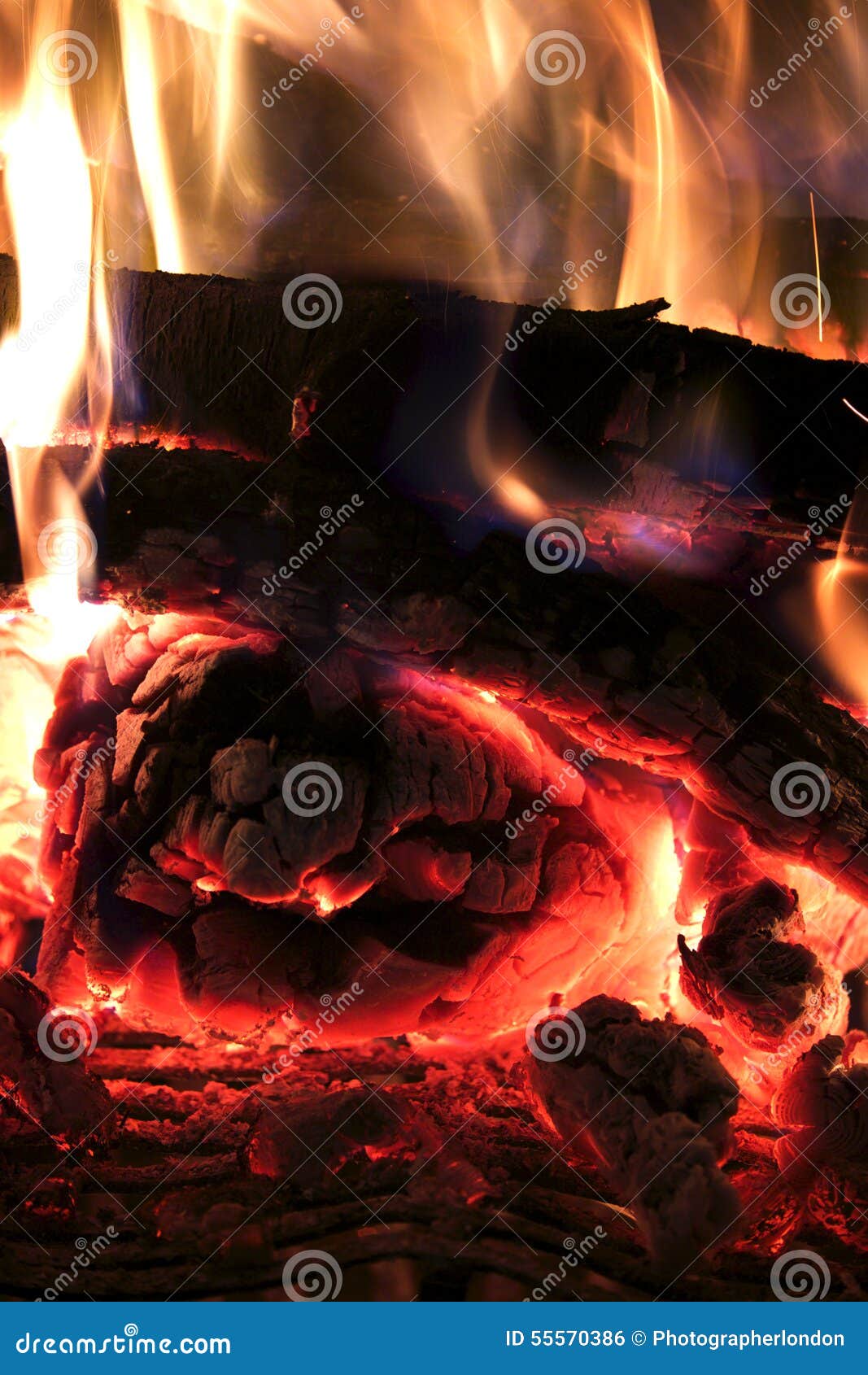 Crest of Flame on Burning Wood in Fireplace Stock Photo - Image of ...