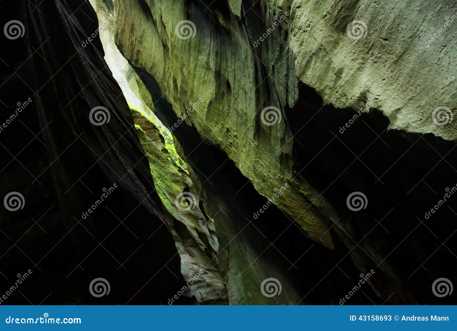 Crevice in Massive Rock with Green Walls Stock Image - Image of shade ...