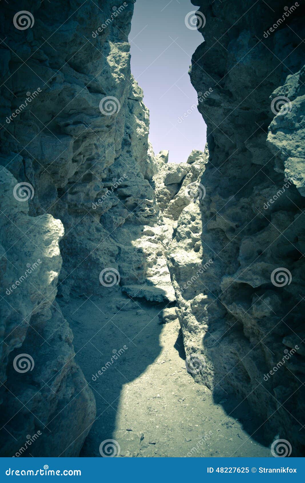 Crevice in the Rock, Forming a Tunnel. Tinted Stock Image - Image of ...