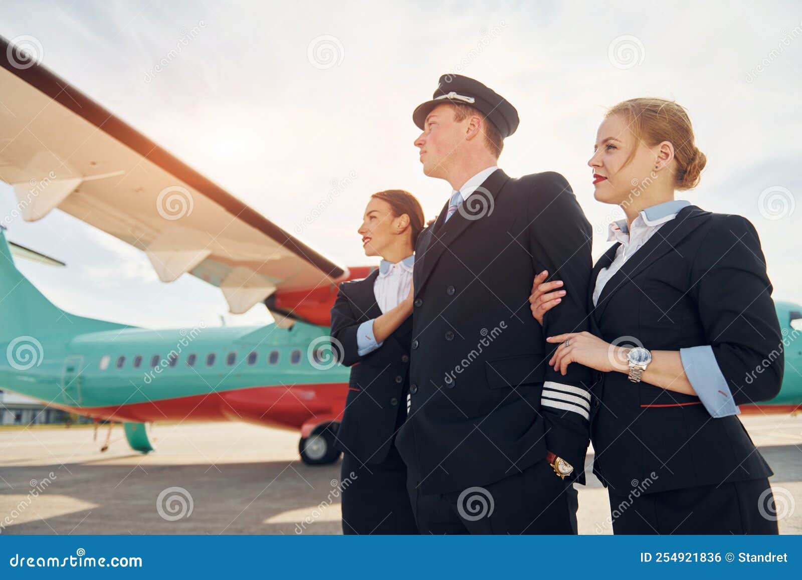 Crew of Airport and Plane Workers in Formal Clothes Standing Outdoors ...