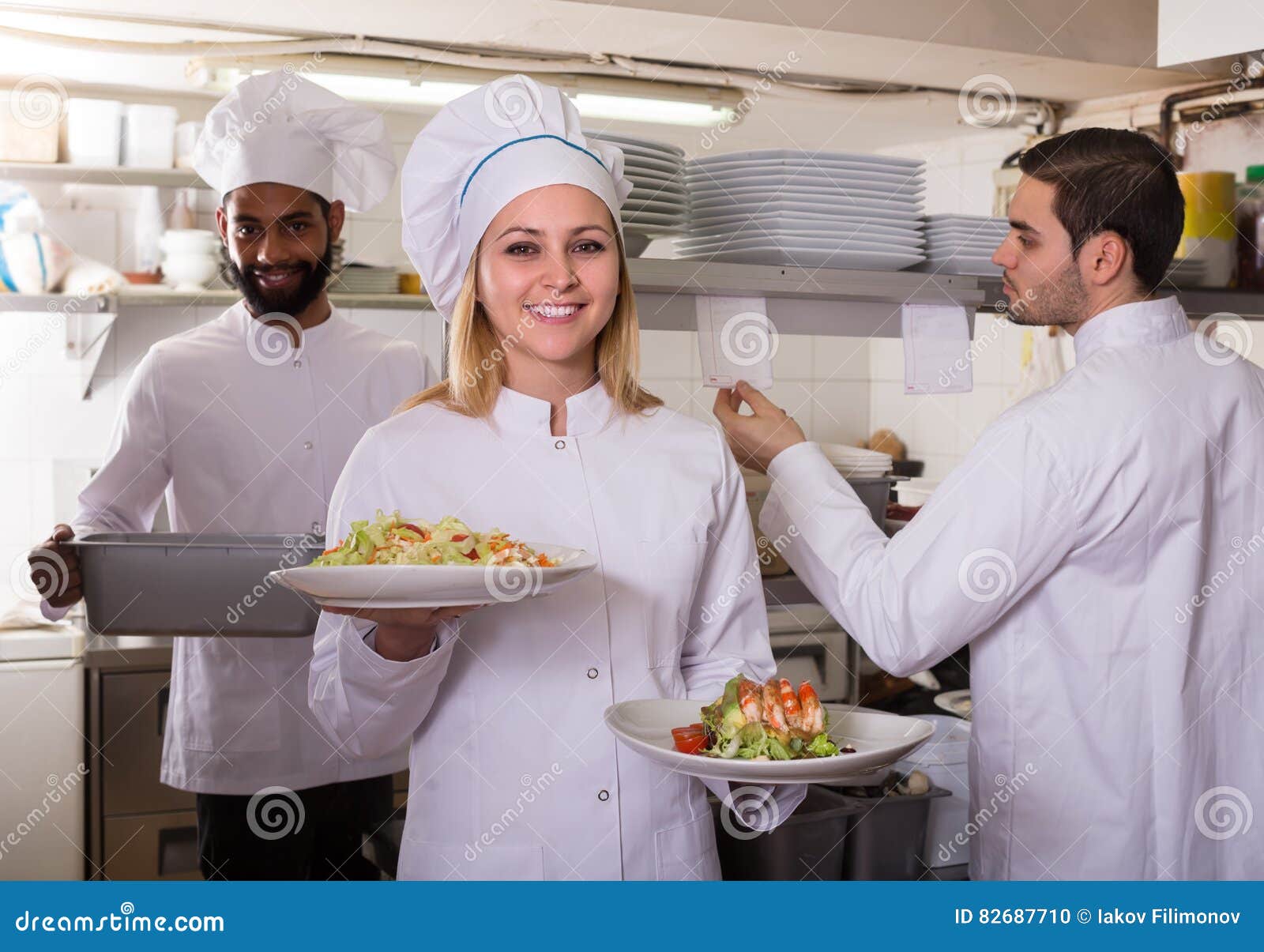 Crew of Professional Cooks Working at Restaurant Stock Photo - Image of ...