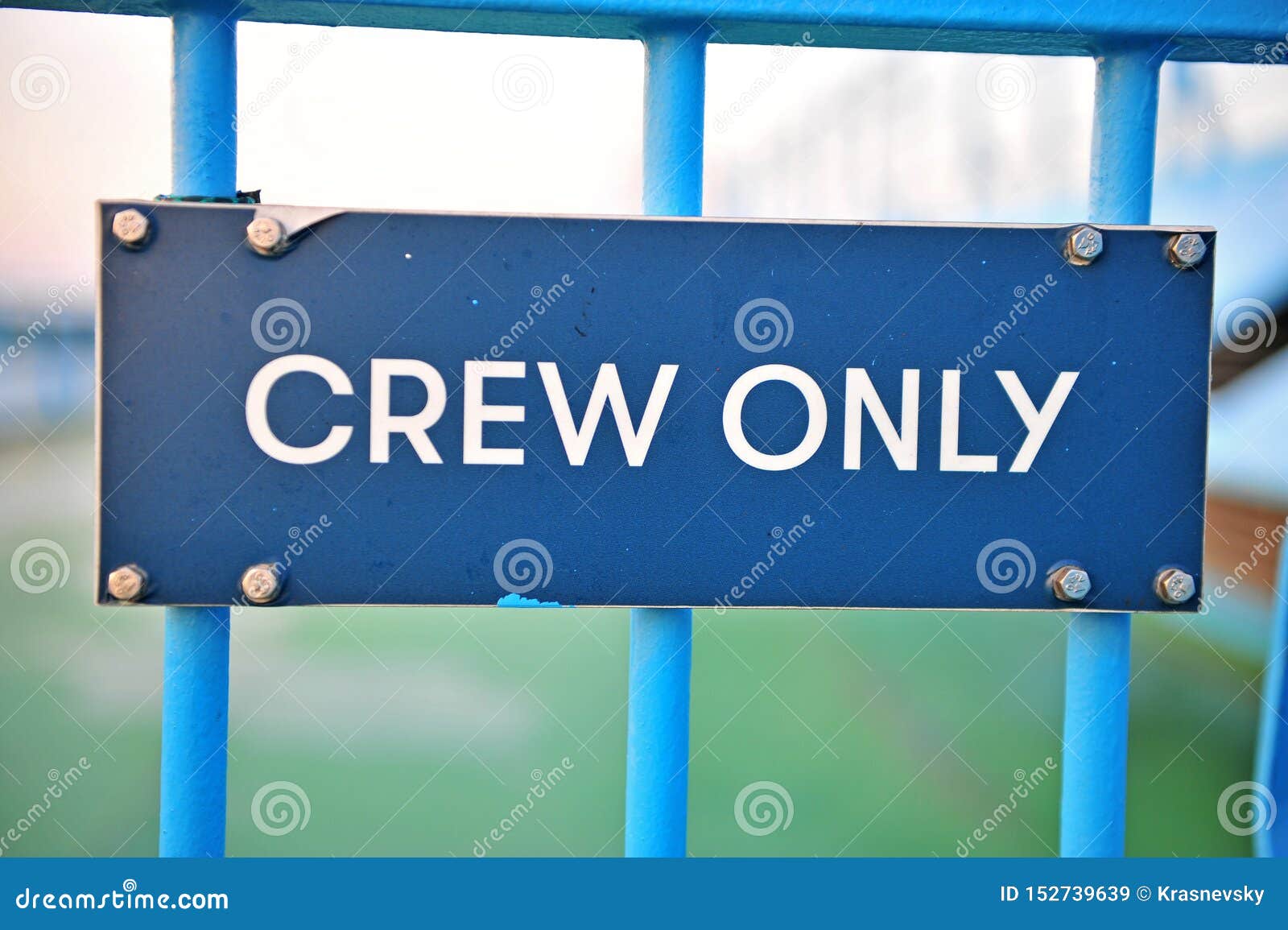 Crew only Sign on Blue Fence Stock Image - Image of transportation ...