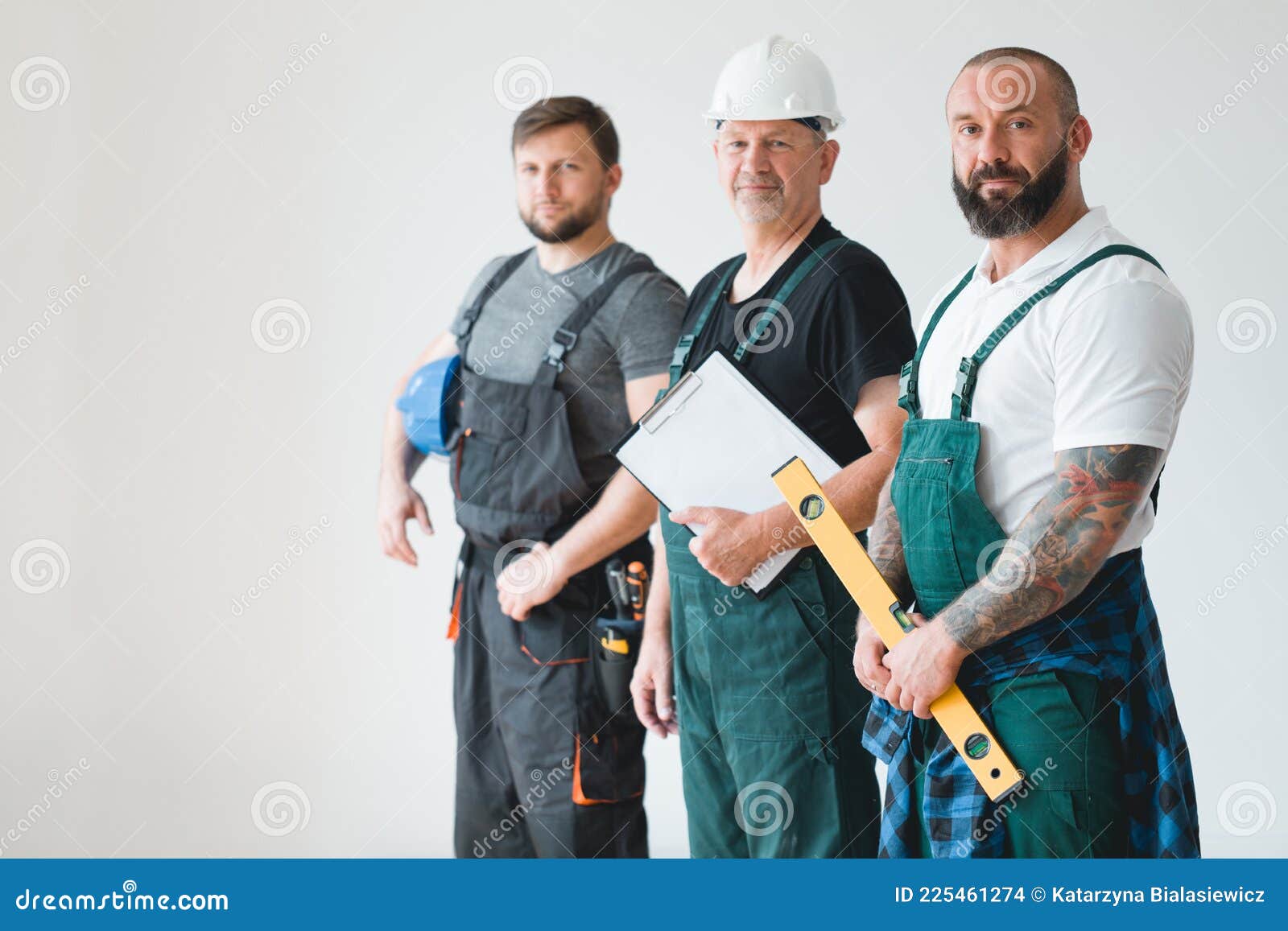 Professional Builder Laying Bricks And Building A House At A ...