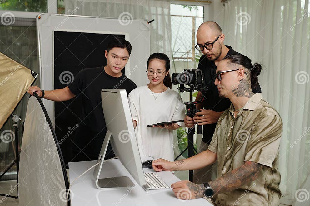 Crew Using Computer To Plan the Shoot Stock Image - Image of shoot ...