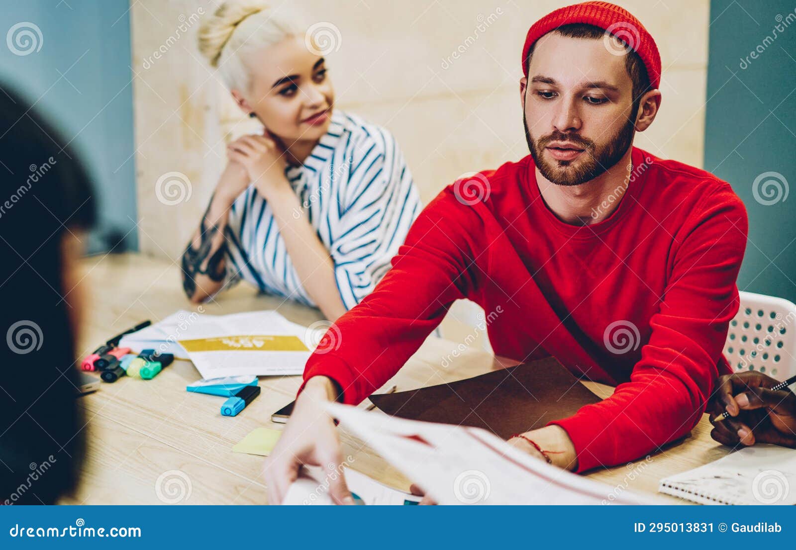 Crew of Young Students Cooperating on Projects Sitting at Desktop ...