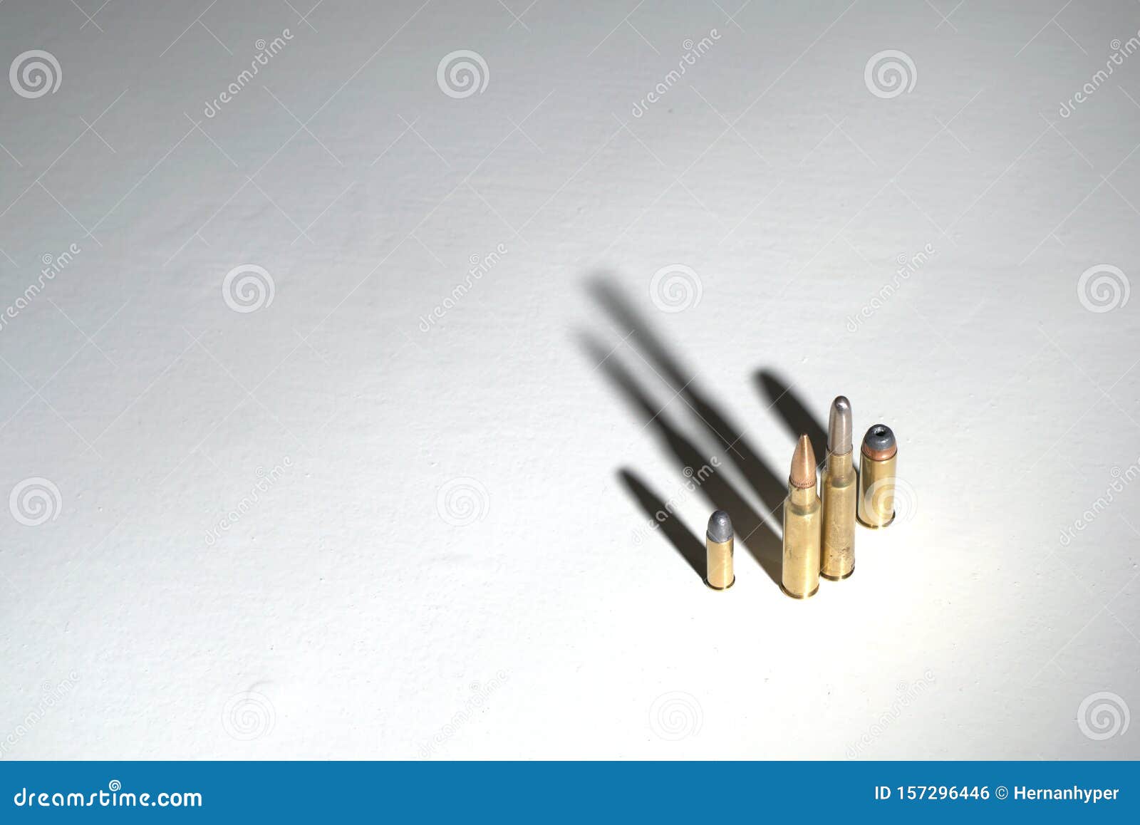 Crime Family Concept. Several Bullet Standing on a White Surface. Stock ...