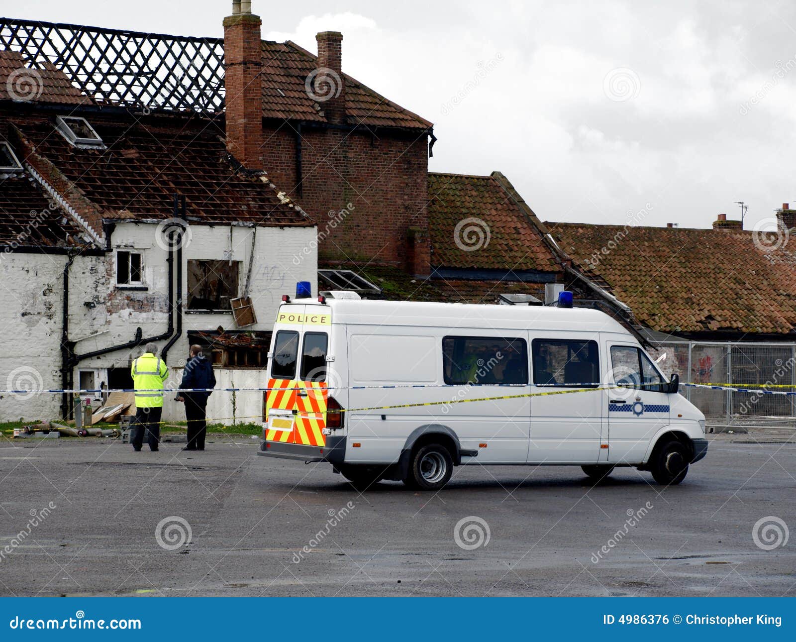 Crime Scene Fire Damaged House with Police Stock Photo - Image of ...