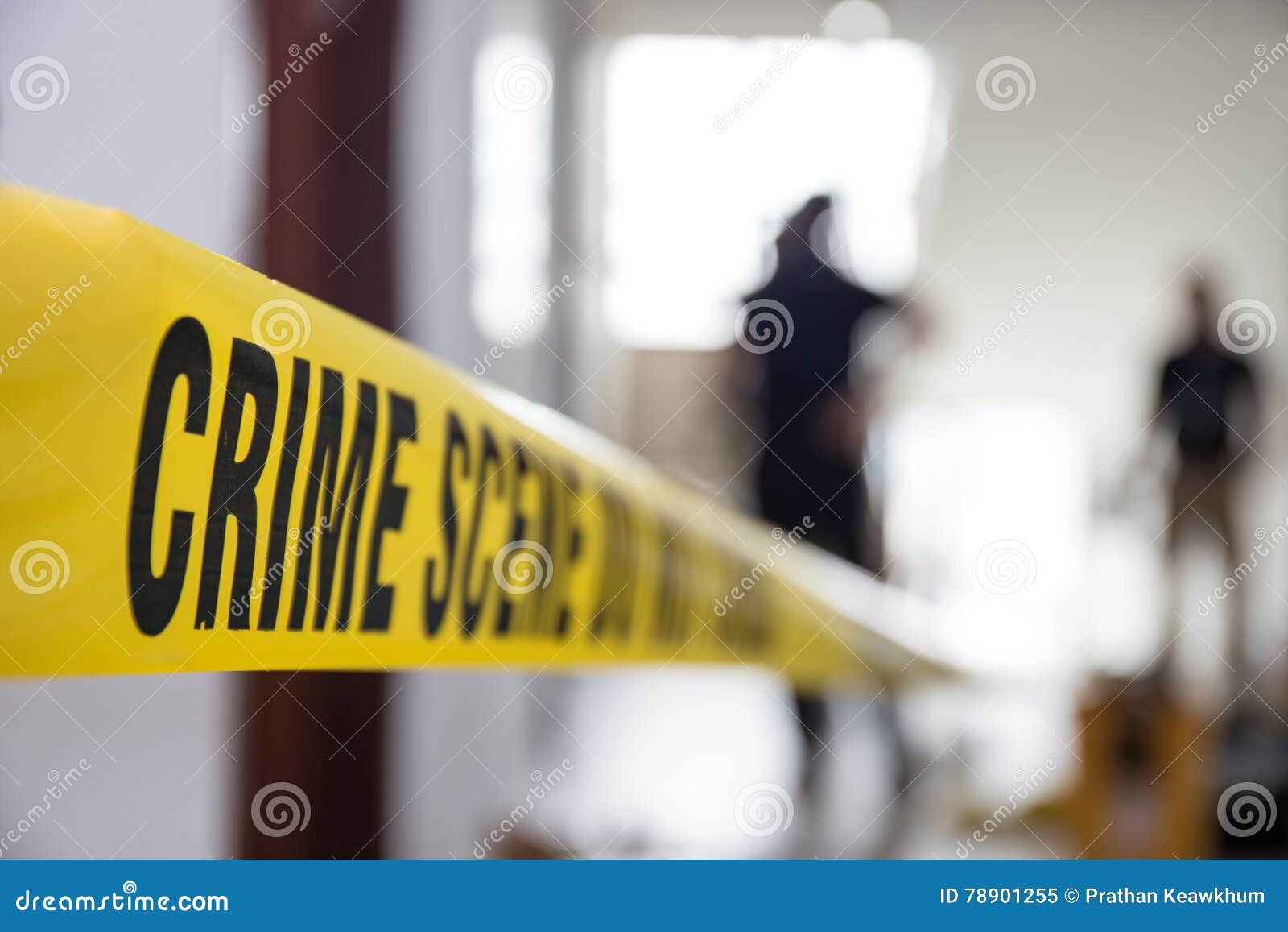 Crime Scene Tape In Building With Blurred Forensic Team Background ...