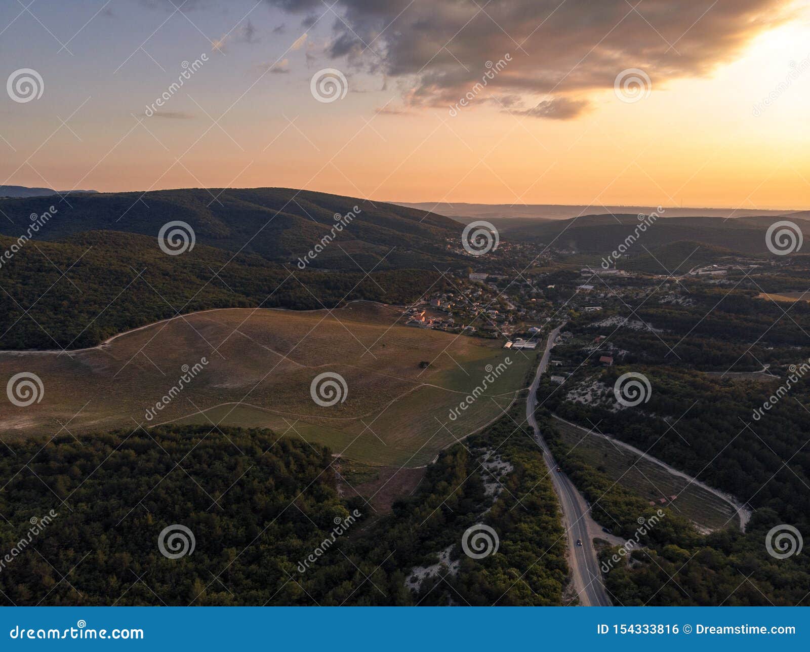 Crimean Village, Surrounded by Forest and Hills at Sunset Stock Photo ...